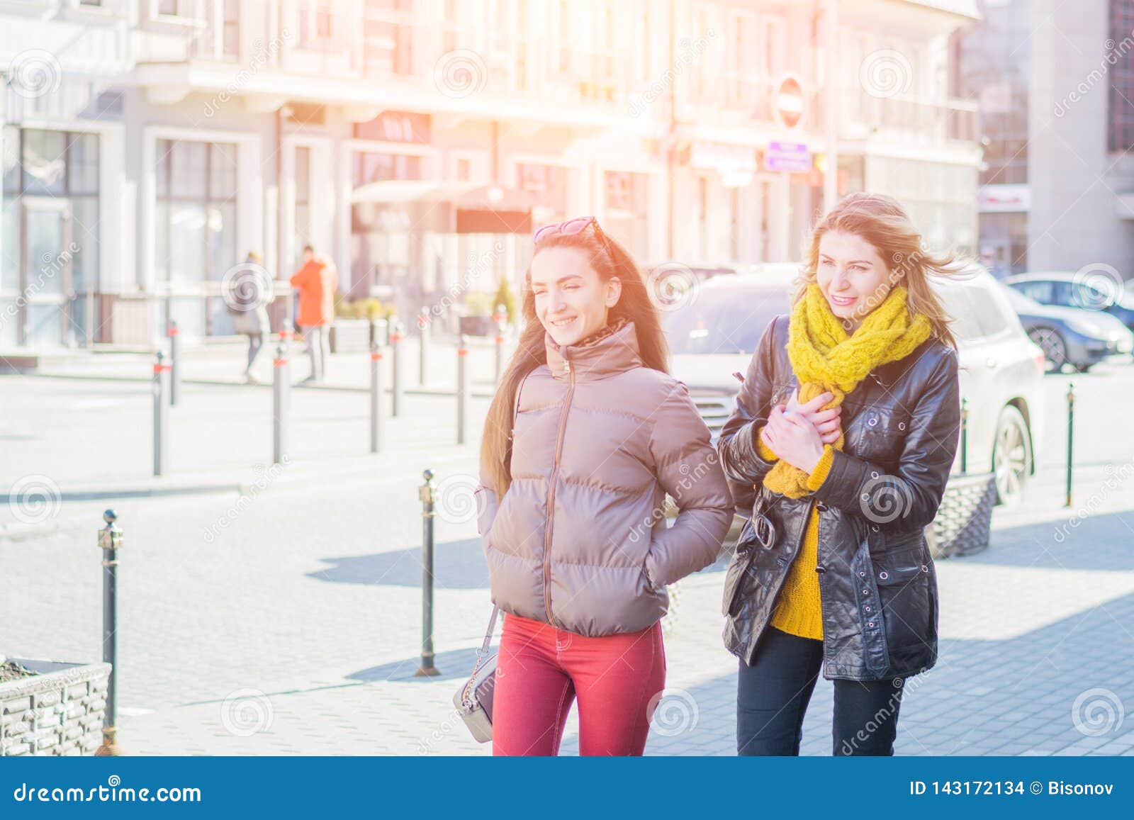 Two Women Walking in the Street Stock Photo - Image of hair, pretty ...