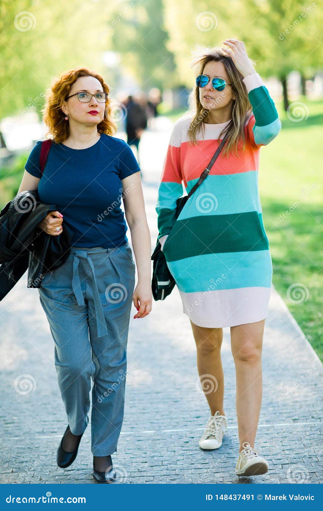 Two Women Walking Together - Having Rest Time Stock Image - Image of ...