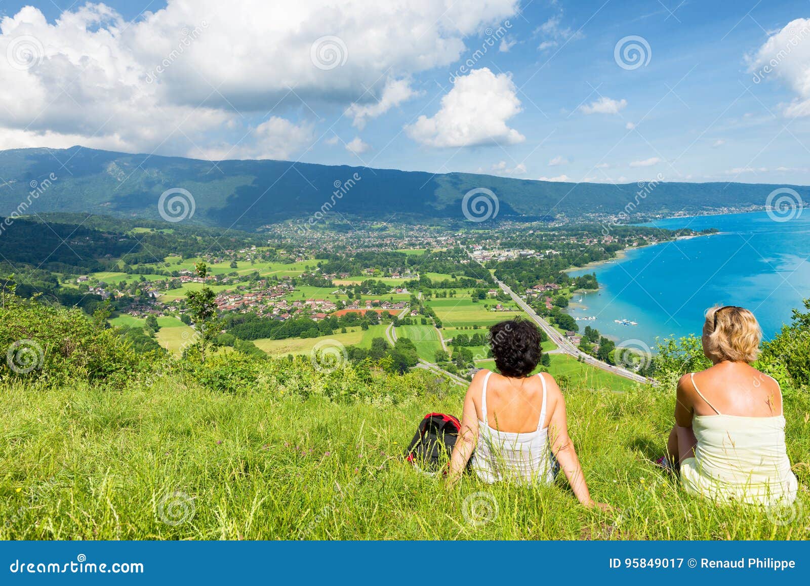Two Women Watching View of Lake Annecy Stock Image - Image of hiking ...