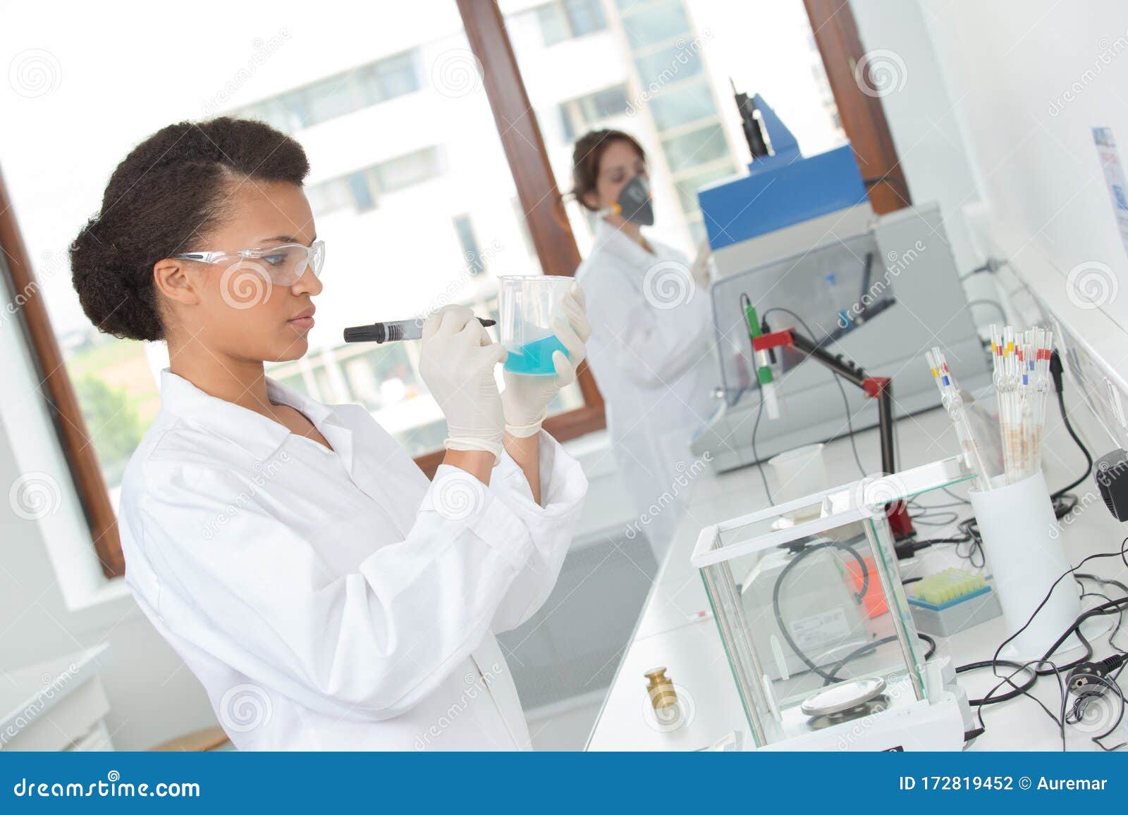 Two Women at Work in Laboratory Stock Photo - Image of mixedrace ...
