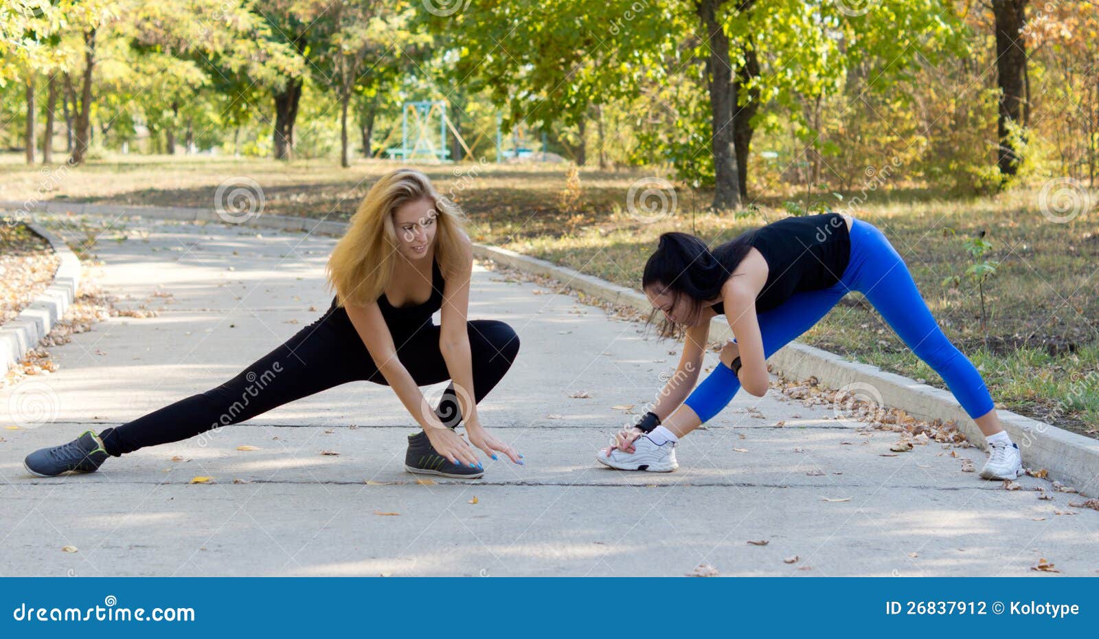 Two Women Working Out Together Stock Photo - Image of workout, outdoors ...
