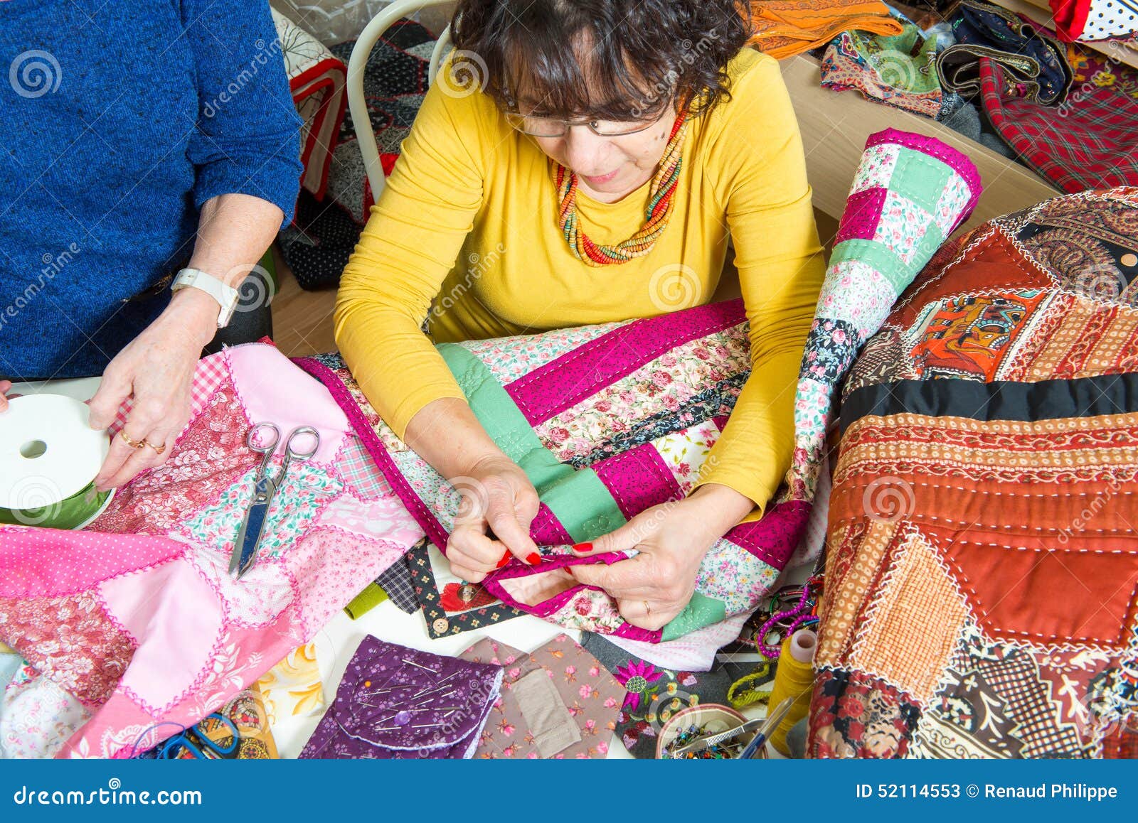 Two Women Working on Their Quilting Stock Image - Image of needle, quilting: 52114553
