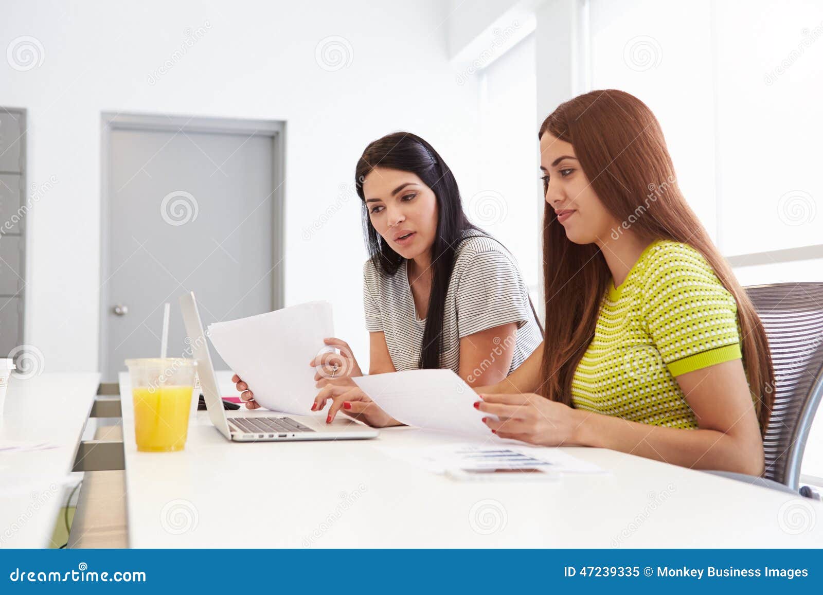 Two Women Working Together in Design Studio Stock Image - Image of ...
