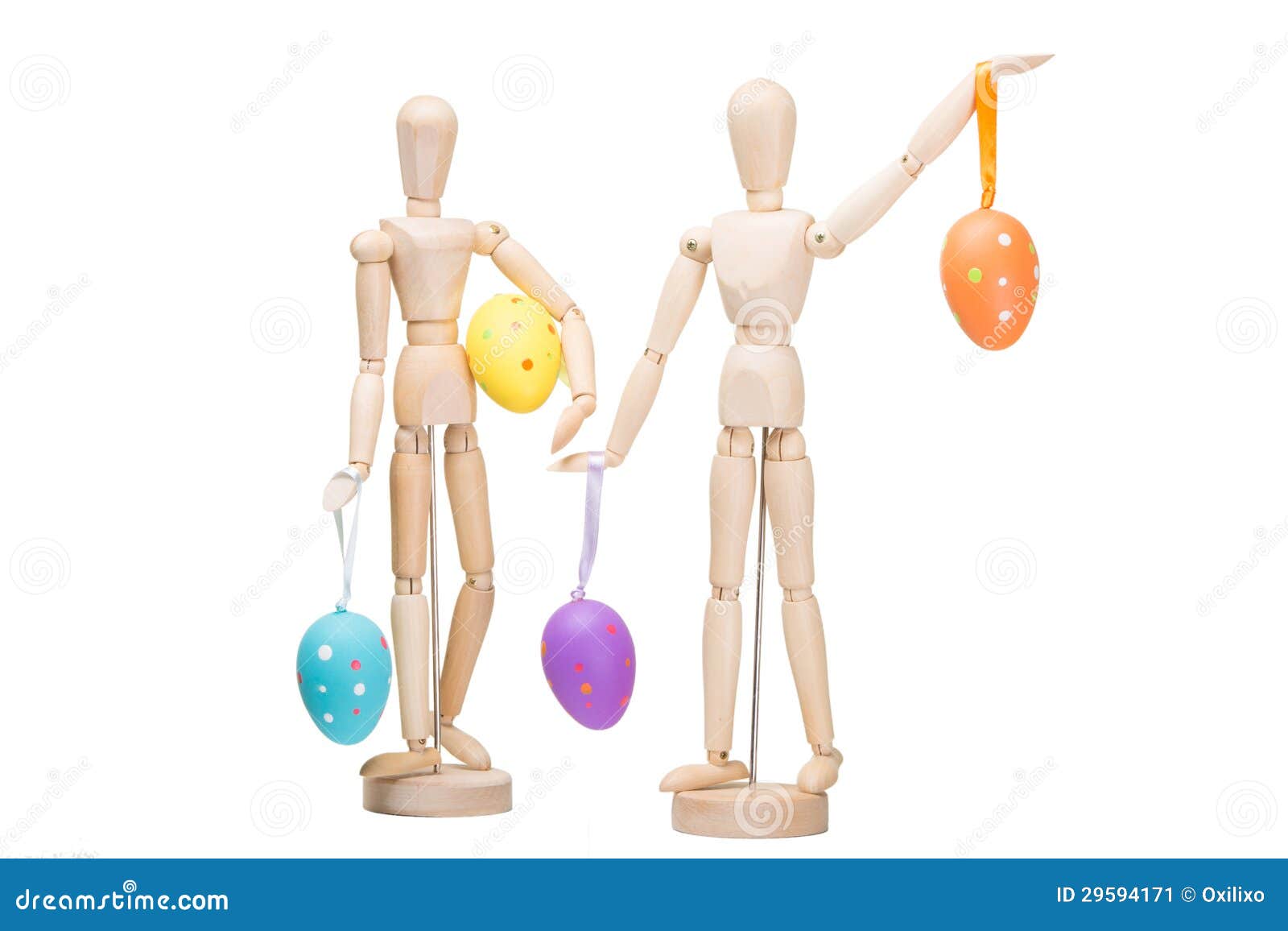 Two Wooden Little Men with Easter Eggs on Isolated White Stock Image ...