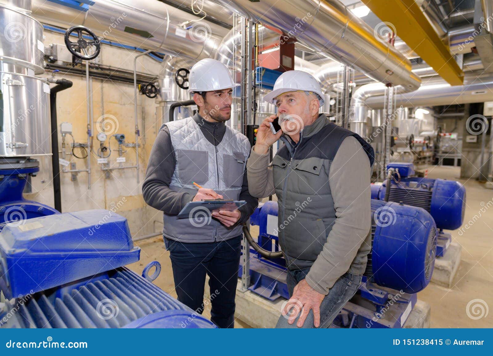 Two worker in factory stock image. Image of equipment - 151238415