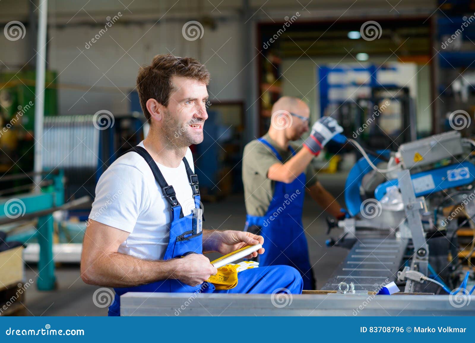 Two worker in factory stock photo. Image of foreman, improvement - 83708796