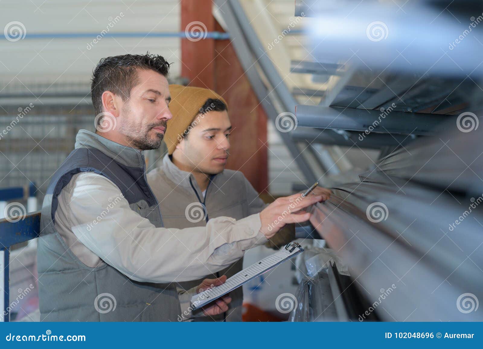 Two Worker in Factory on Machine Stock Photo - Image of active, bench ...