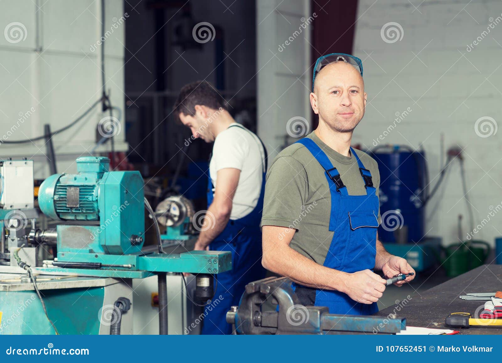 Two worker in factory stock image. Image of occupation - 107652451