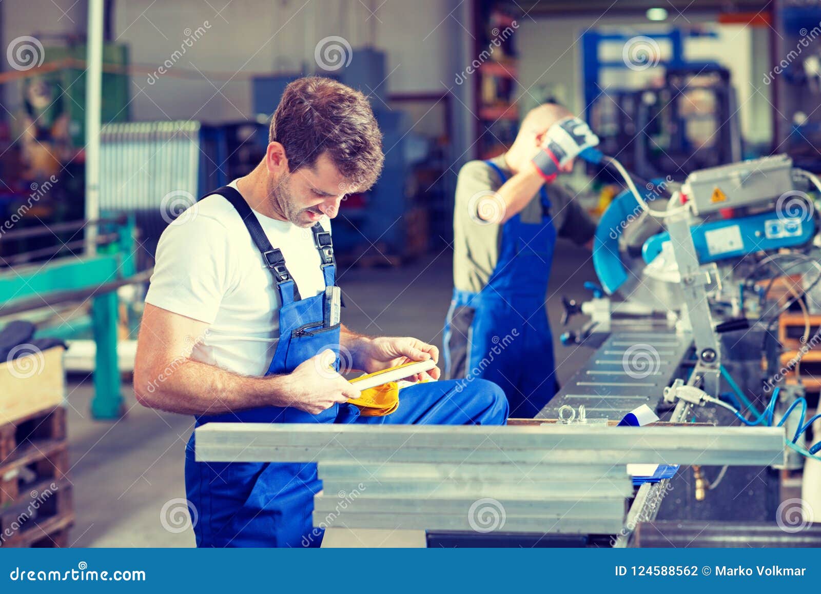 Two worker in factory stock photo. Image of foreman - 124588562