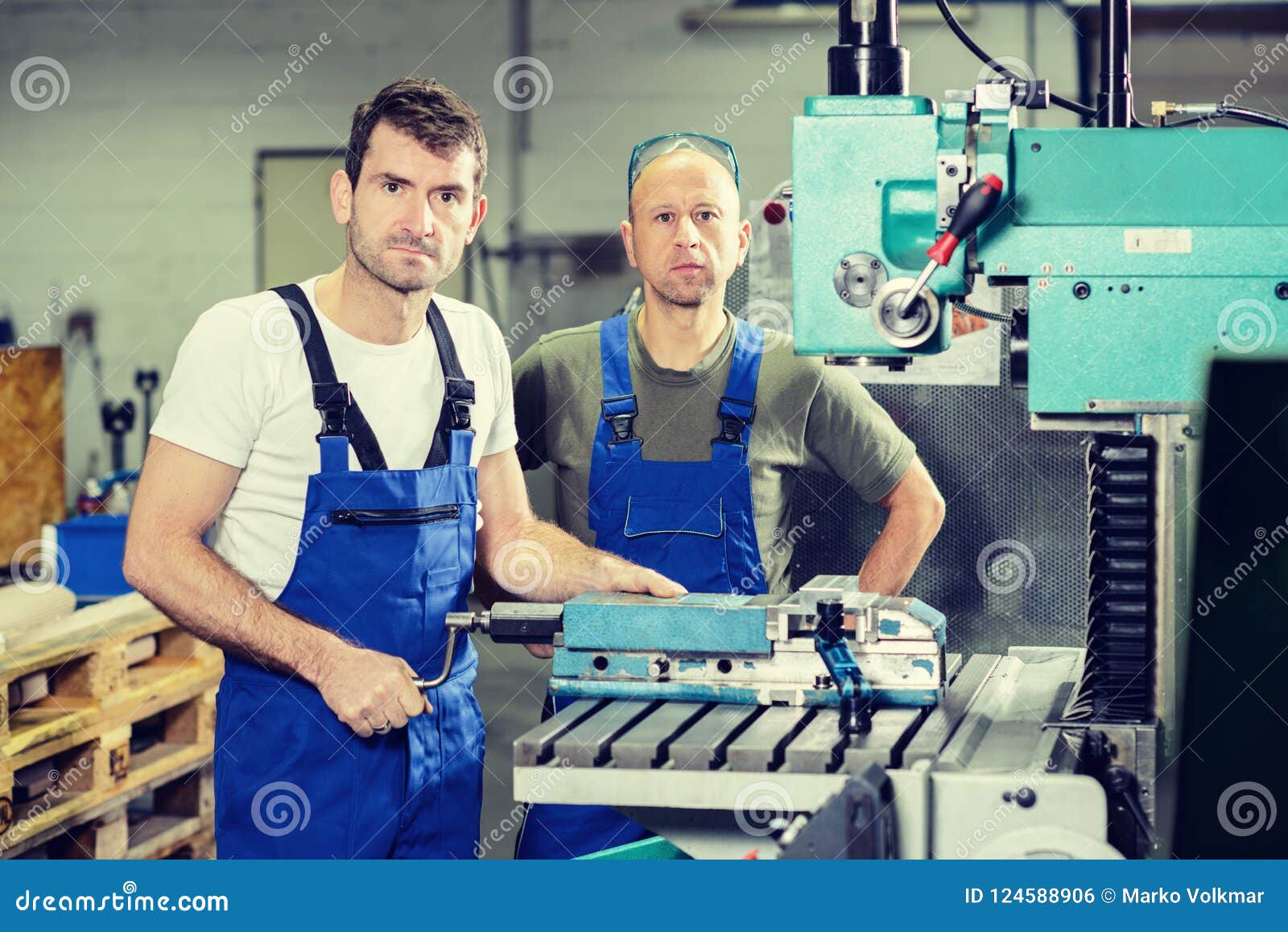 Two worker in factory stock photo. Image of foreman - 124588906