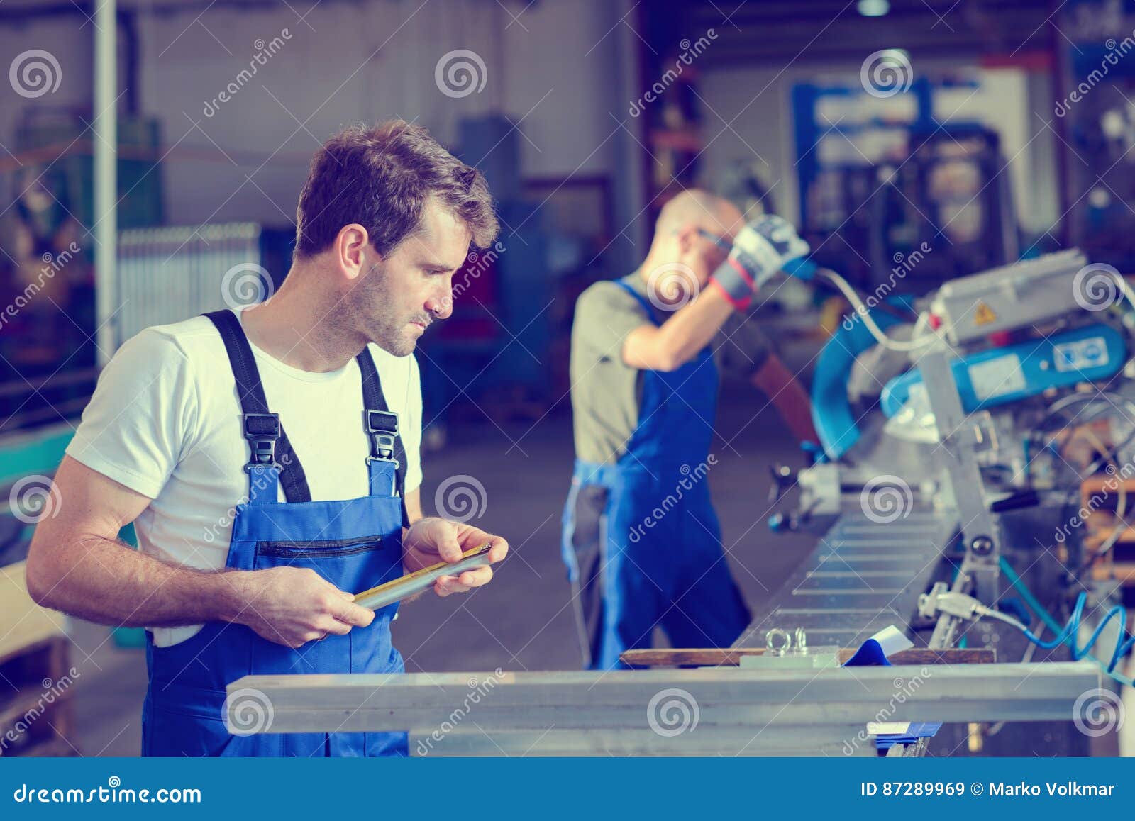Two worker in factory stock image. Image of metal, middle - 87289969