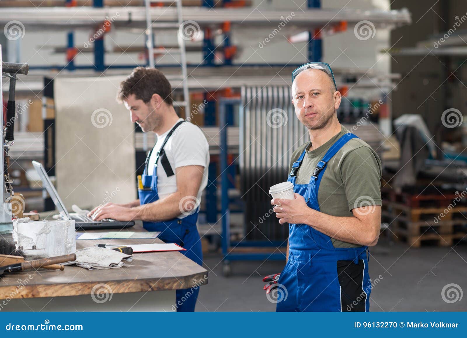 Two worker in factory stock photo. Image of middle, manufacturing ...