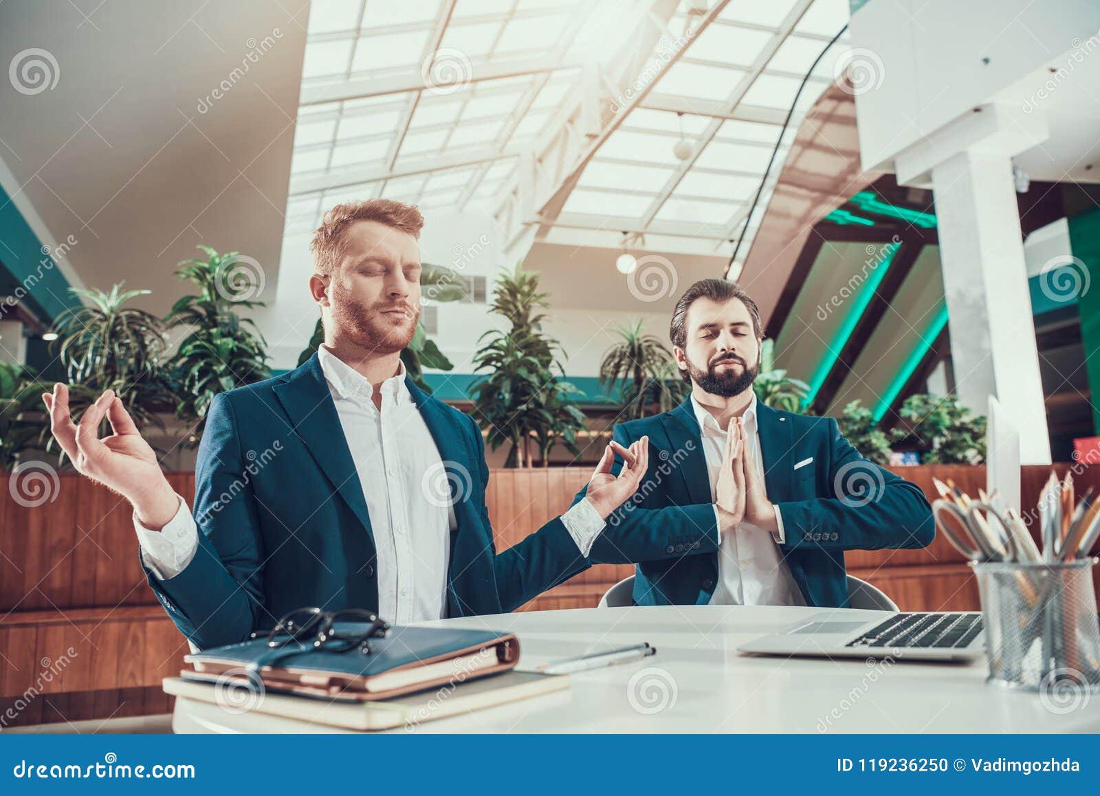 Two Worker Men Meditating at Desk in Office. Stock Photo - Image of ...