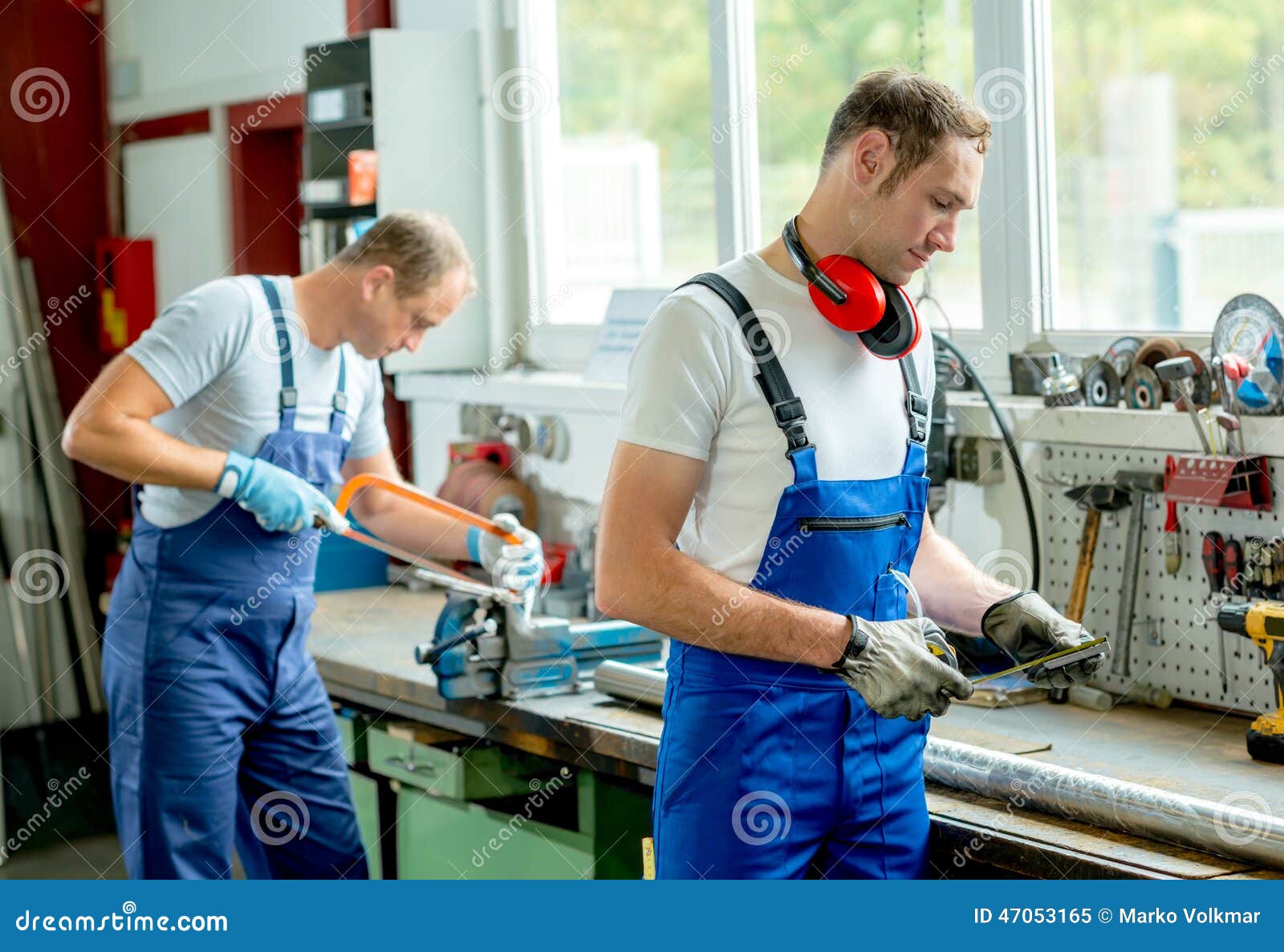 Two worker on work bench stock image. Image of conservation - 47053165