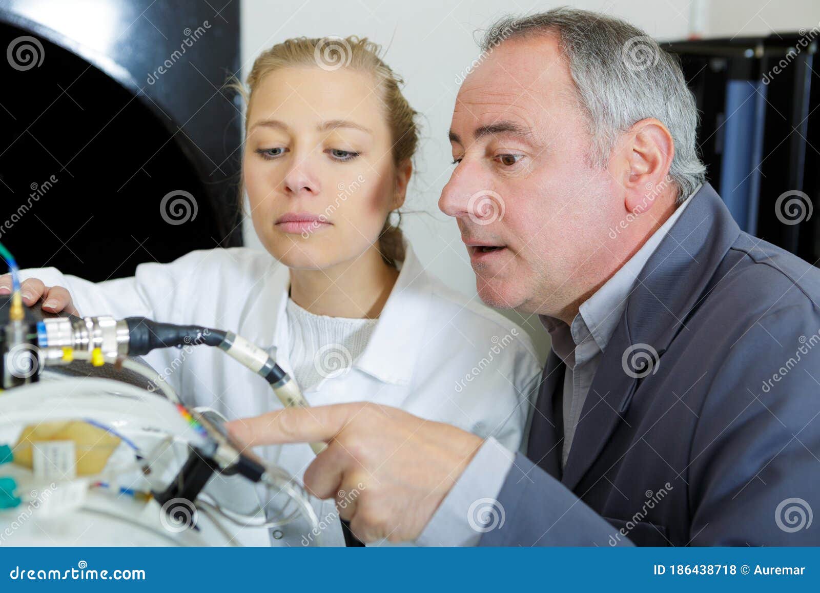 Two Workers Adjusting Pipes Stock Photo - Image of adjustable ...