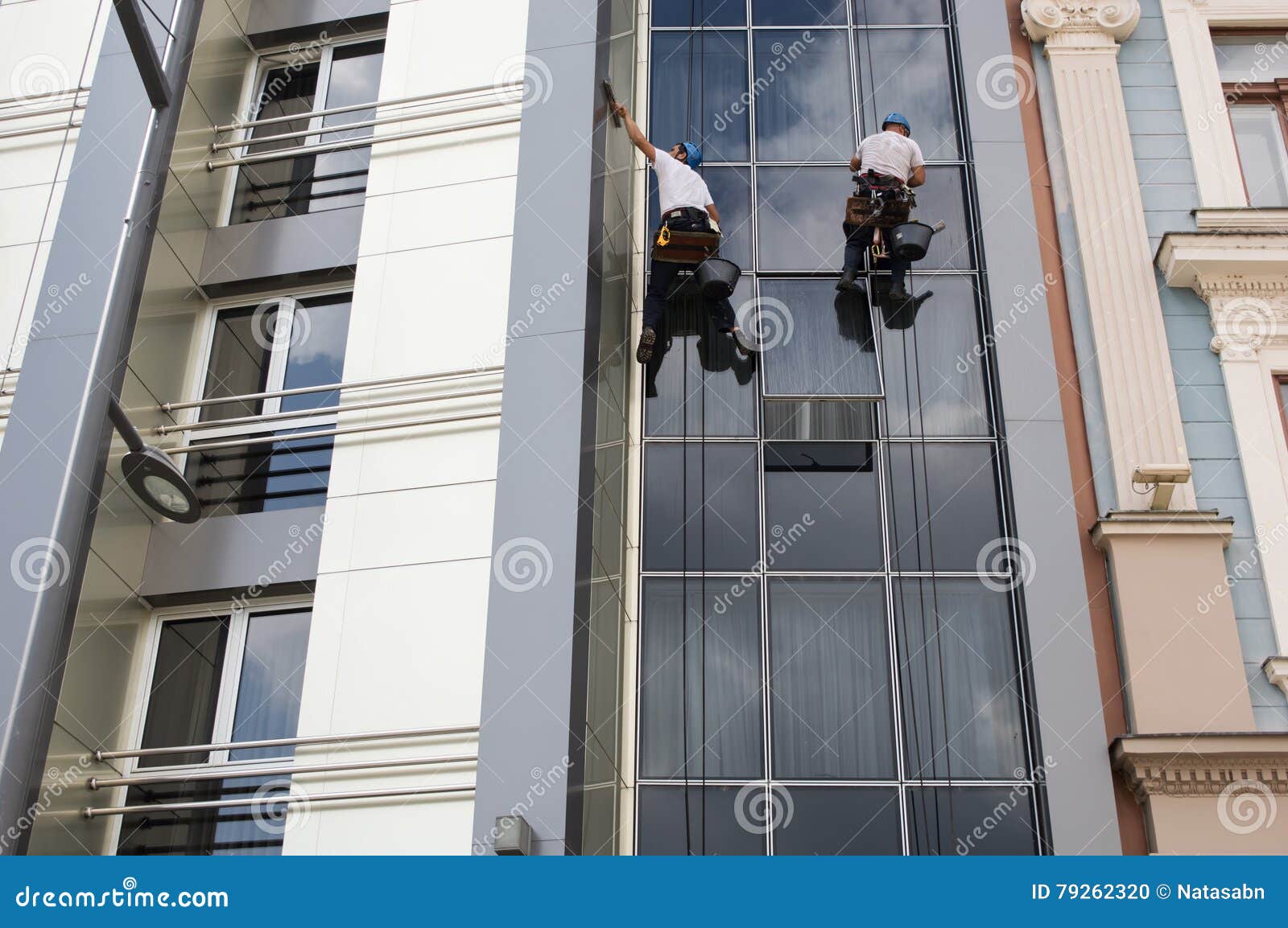 Two Workers Cleaning Windows on High Rise Building Editorial Image ...