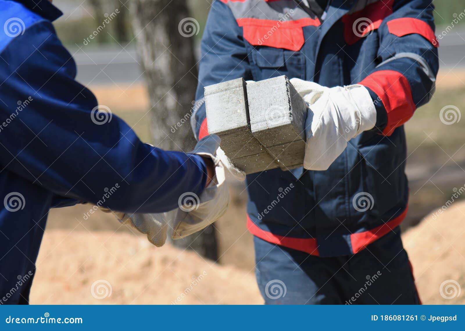 Two Workers Throw Concrete Blocks. Stock Image - Image of gray ...