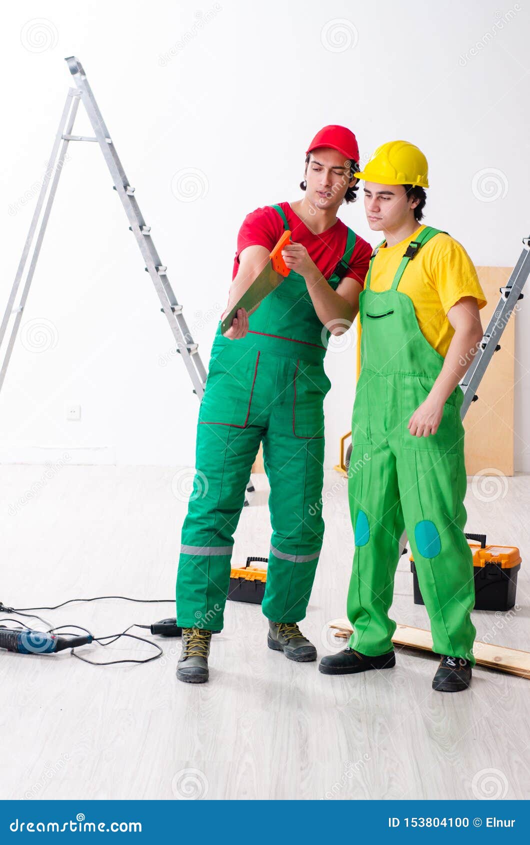 Two Workers Contractors Working Indoors Stock Photo - Image of ...