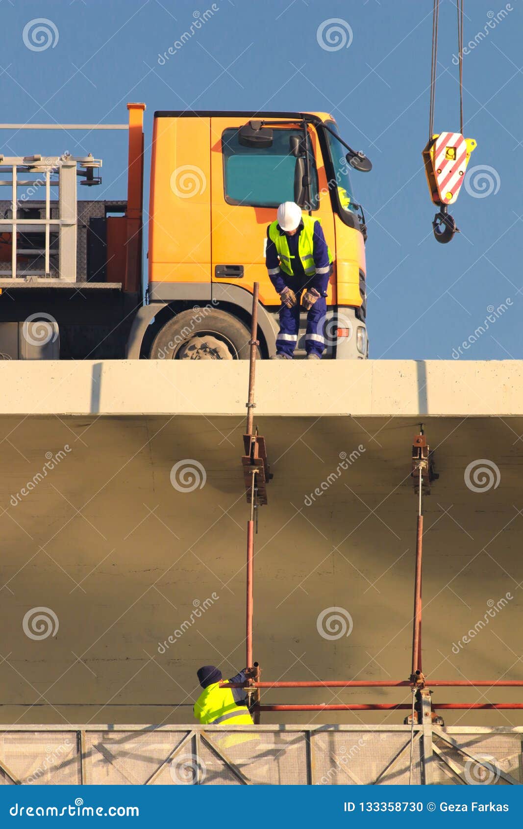 Two Workers, Crane and Track at the Reconstruction Area Stock Photo ...