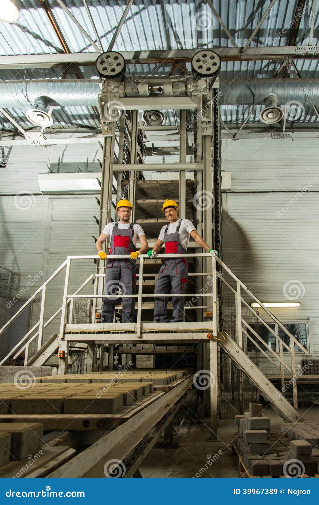 Two workers on a factory stock image. Image of process - 39967389