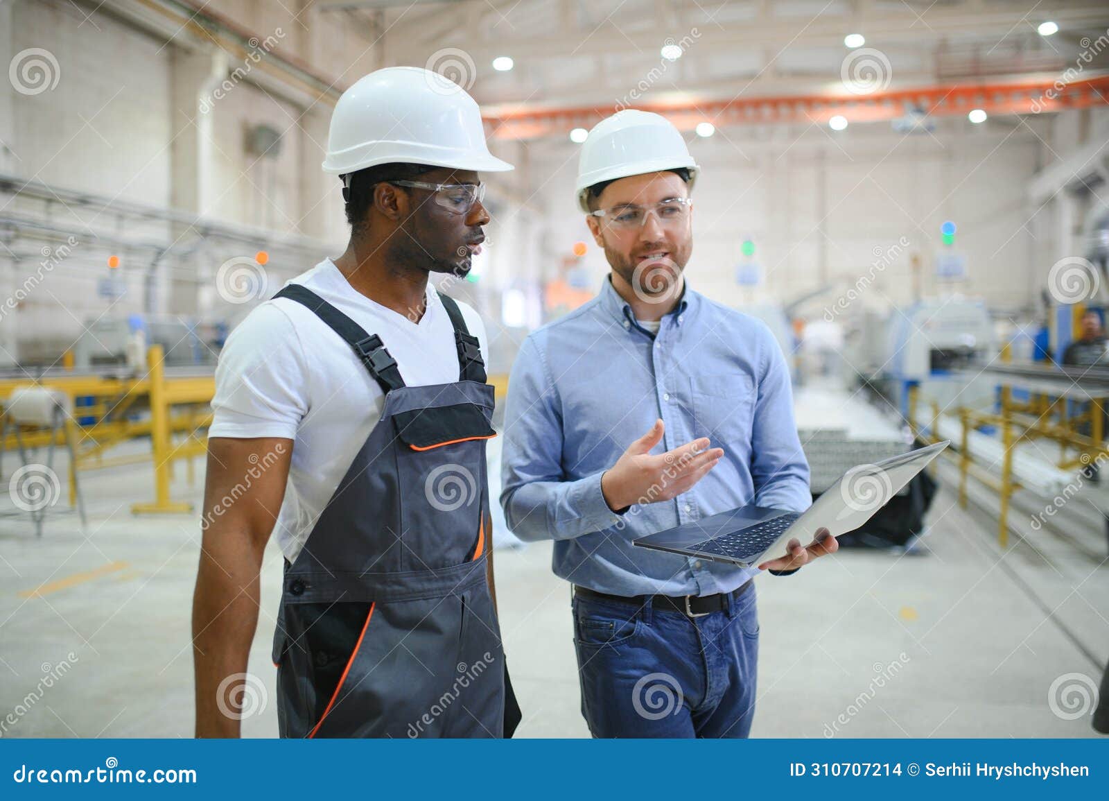 Two Workers at a Factory for the Production of Plastic Windows ...