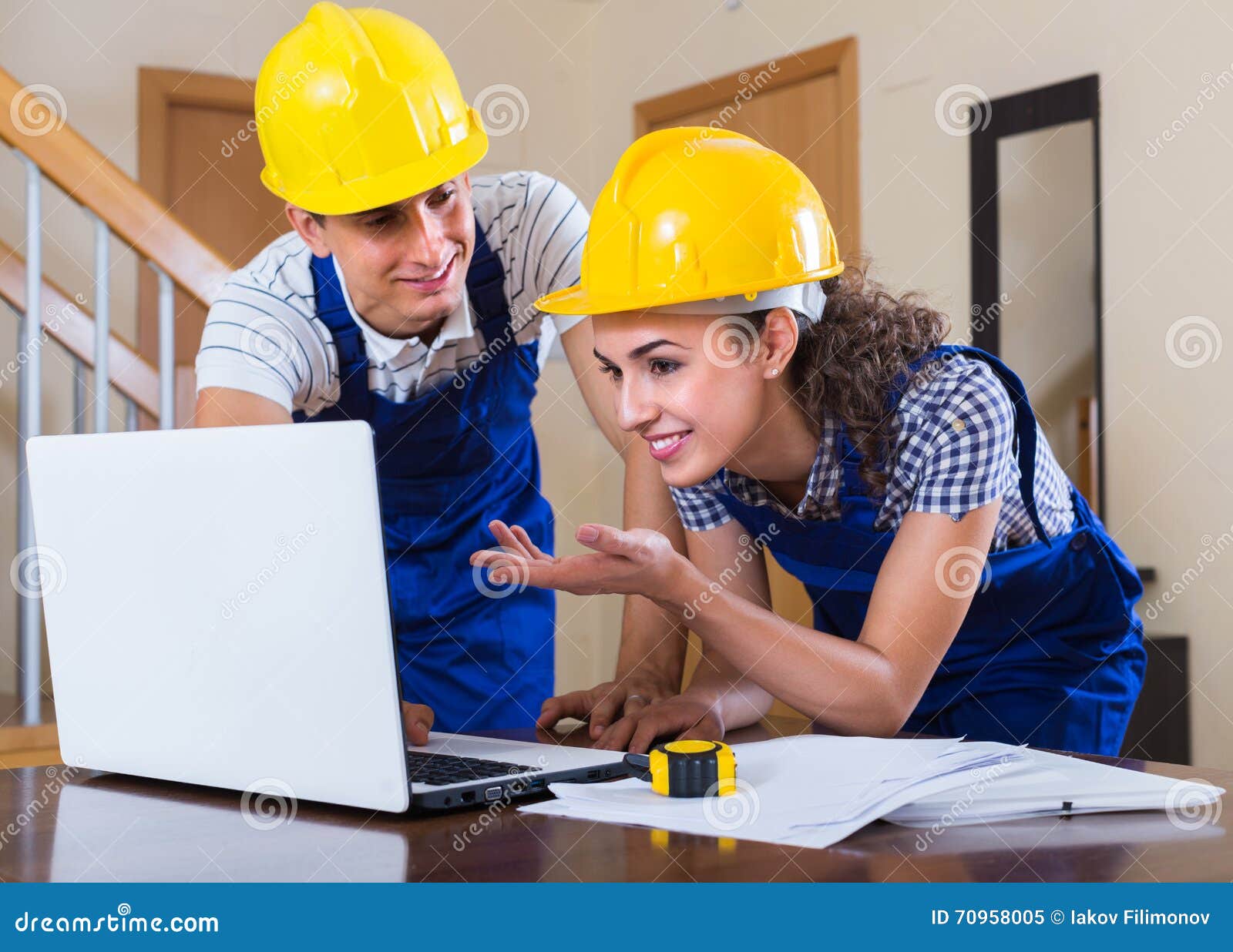 Two Workers in Helmets with Laptop Stock Image - Image of adult, inside ...