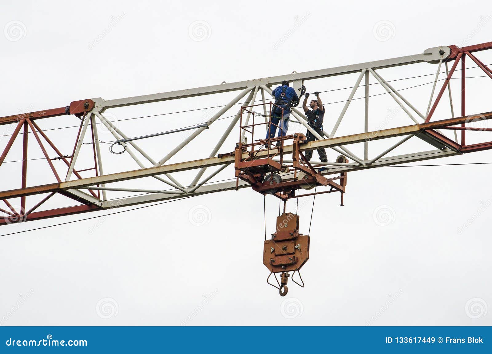 Two Workers on the Horizontal Section of a Crane Editorial Stock Image ...