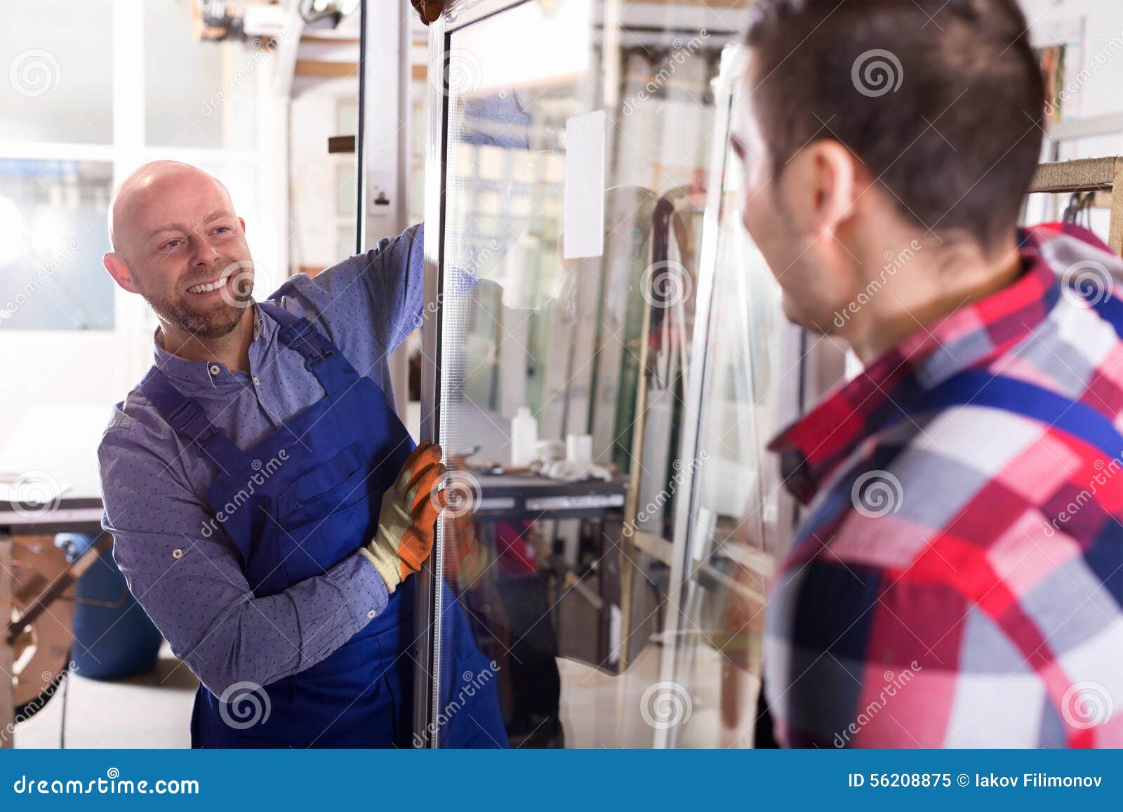 Two Workers Inspecting Windows Stock Image - Image of effective ...