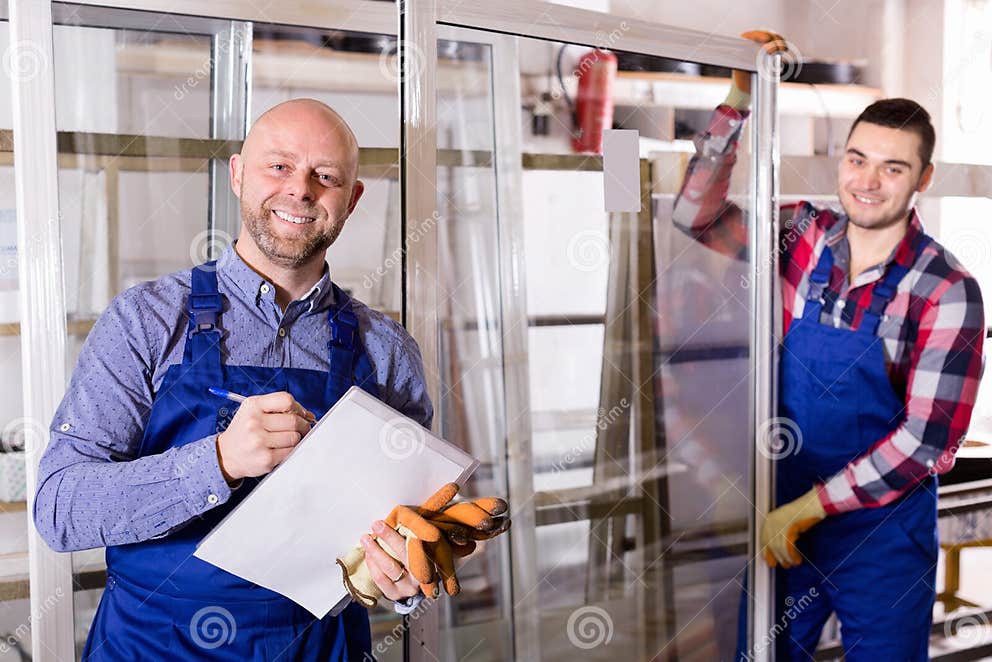 Two Workers Inspecting Windows Stock Image - Image of people, security ...