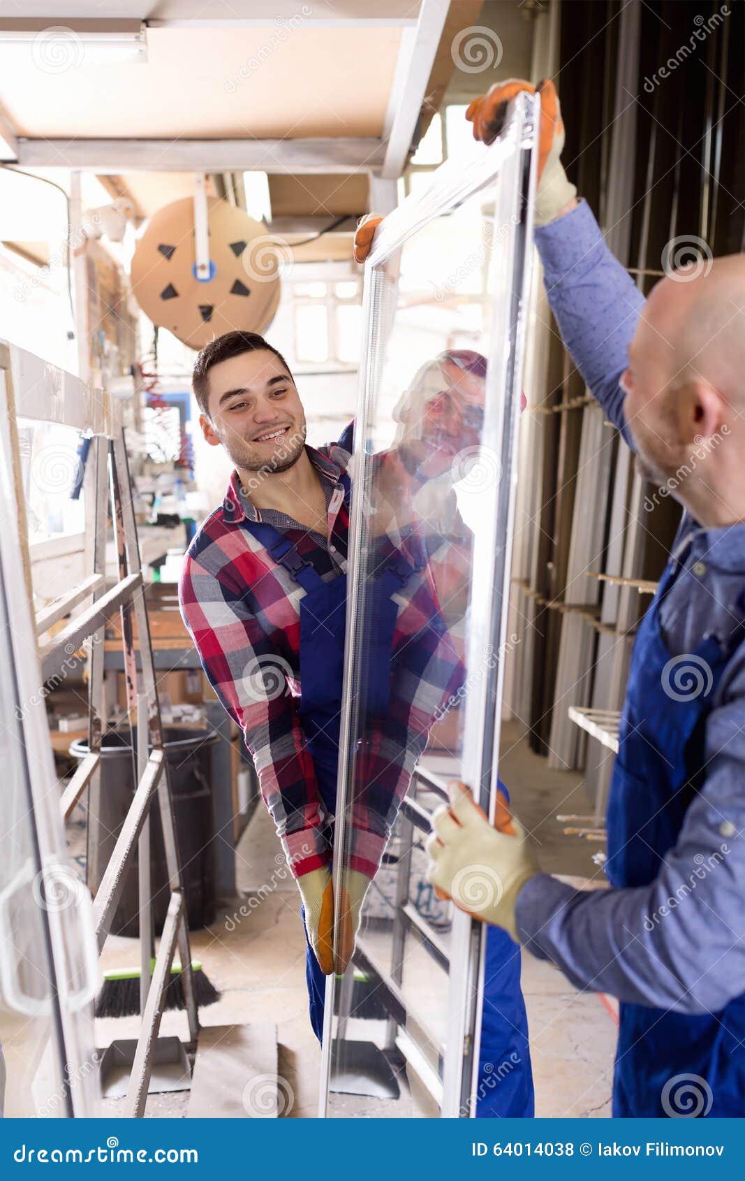 Two Workers Inspecting Windows Stock Photo - Image of plant, depository ...