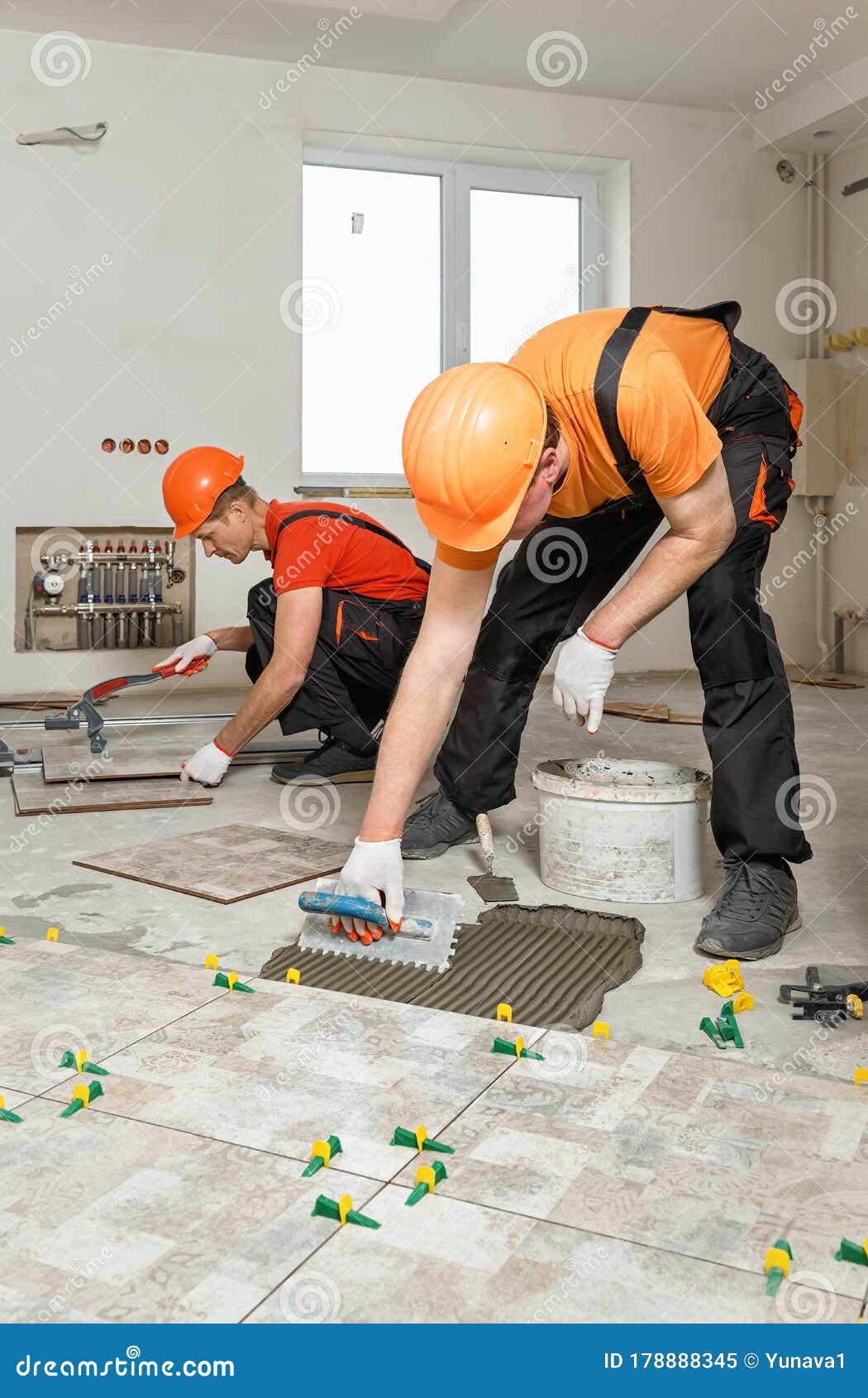 Installing Ceramic Tiles on the Floor Stock Image - Image of cutter ...
