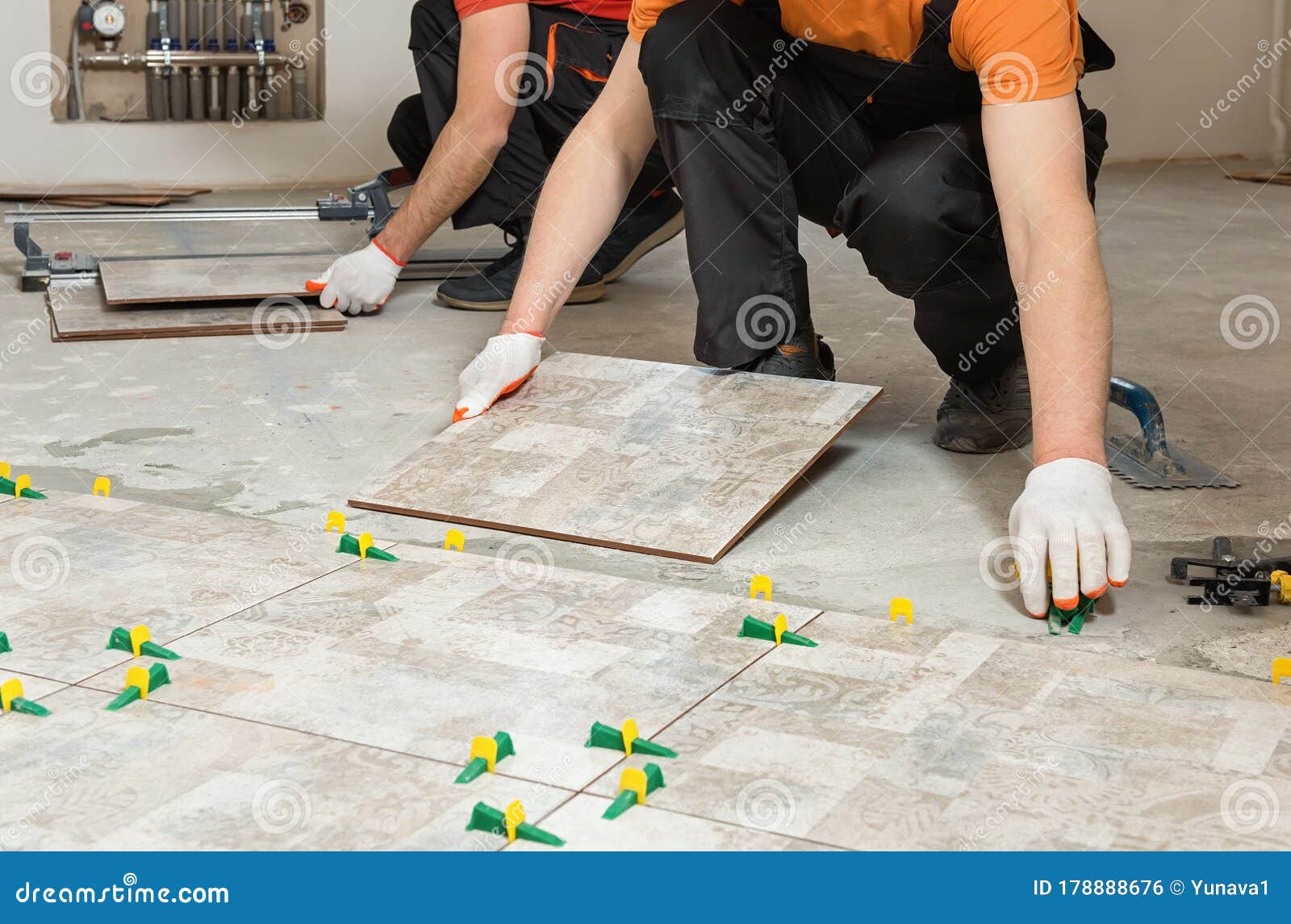 Installing Ceramic Tiles on the Floor Stock Photo - Image of decorating ...