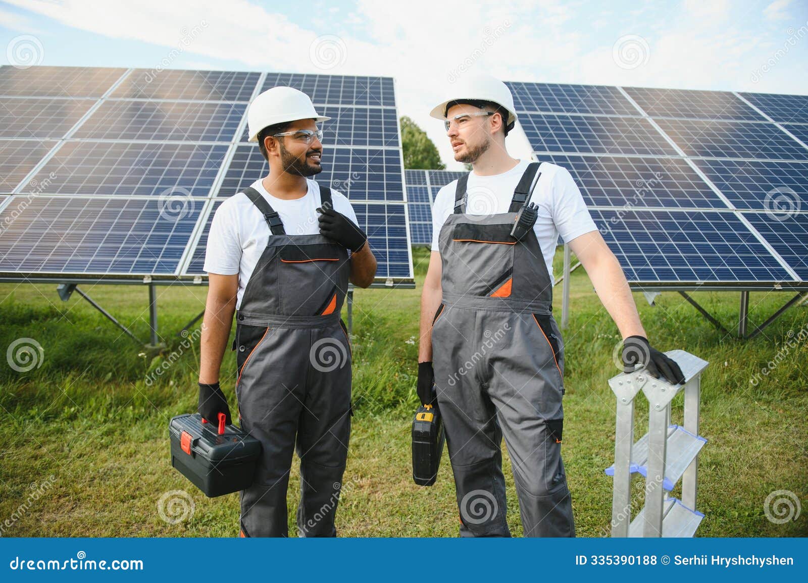 Two Workers Installing Solar Panels Stock Photo - Image of male, indian ...