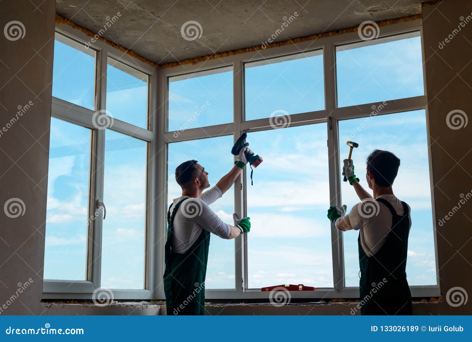 Two Workers Installing a Window Stock Image - Image of foam, craftsman ...