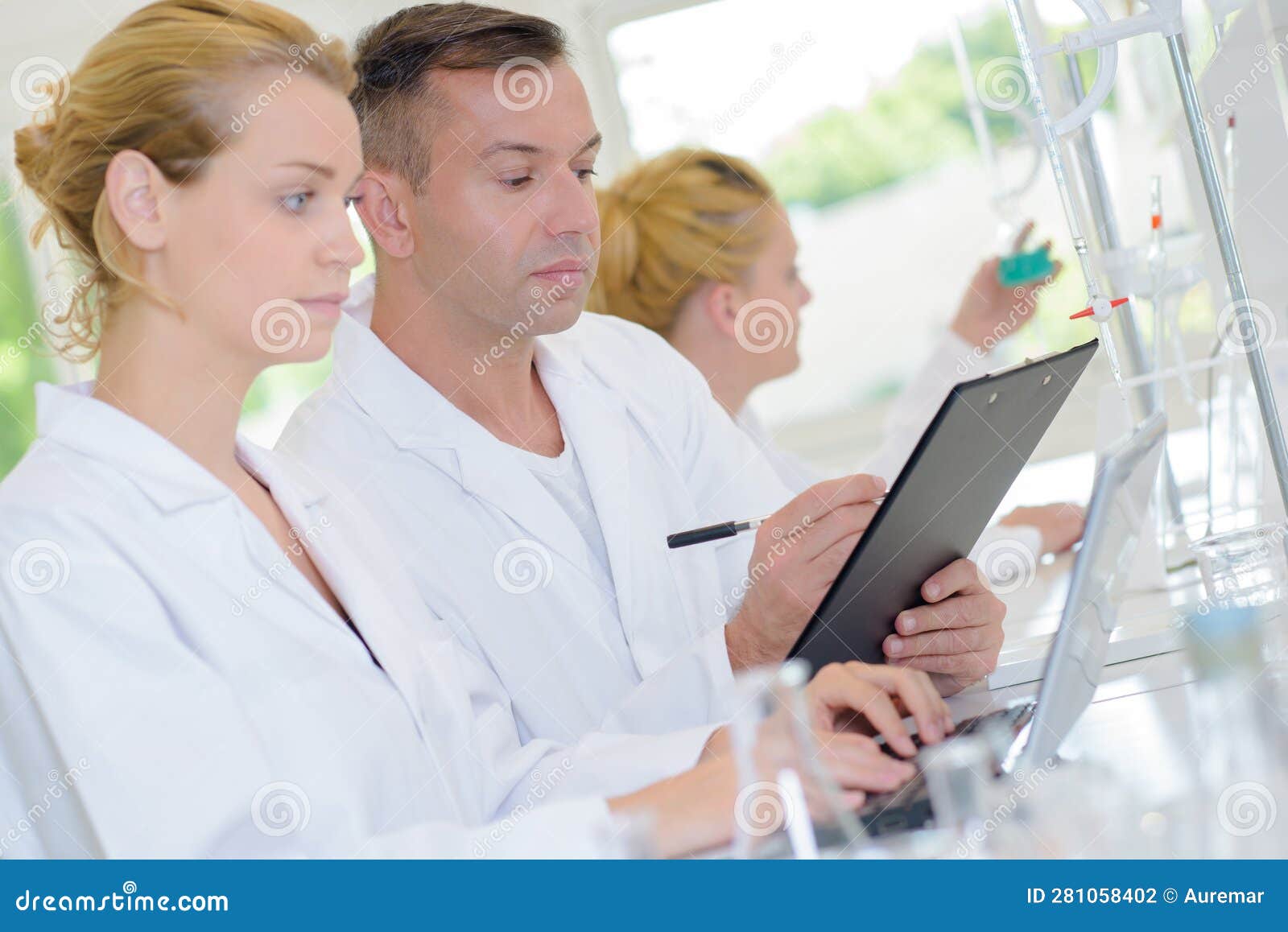 Two workers in laboratory stock photo. Image of experimental - 281058402