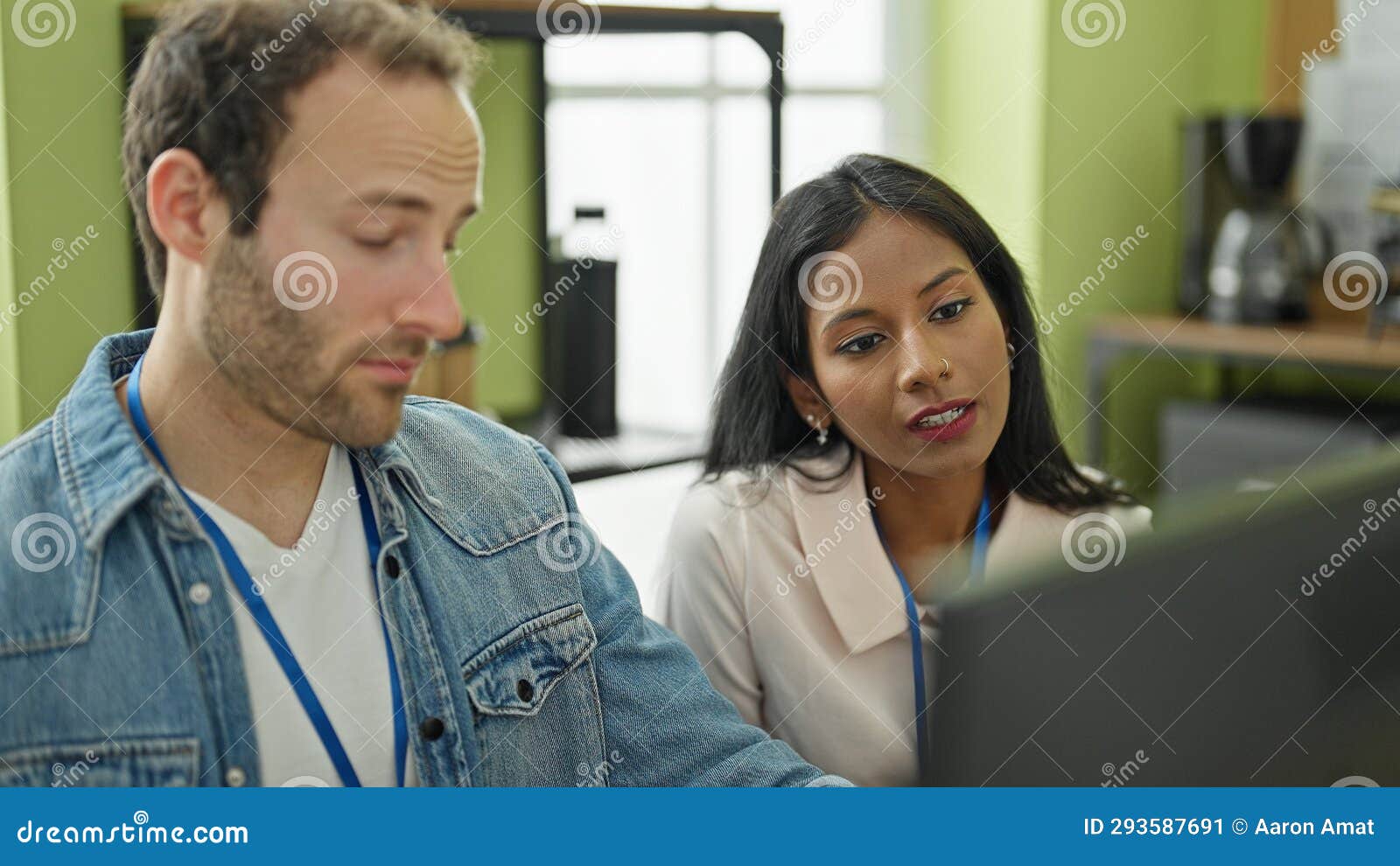 Two Workers Man and Woman Using Computer Speaking at the Office Stock ...