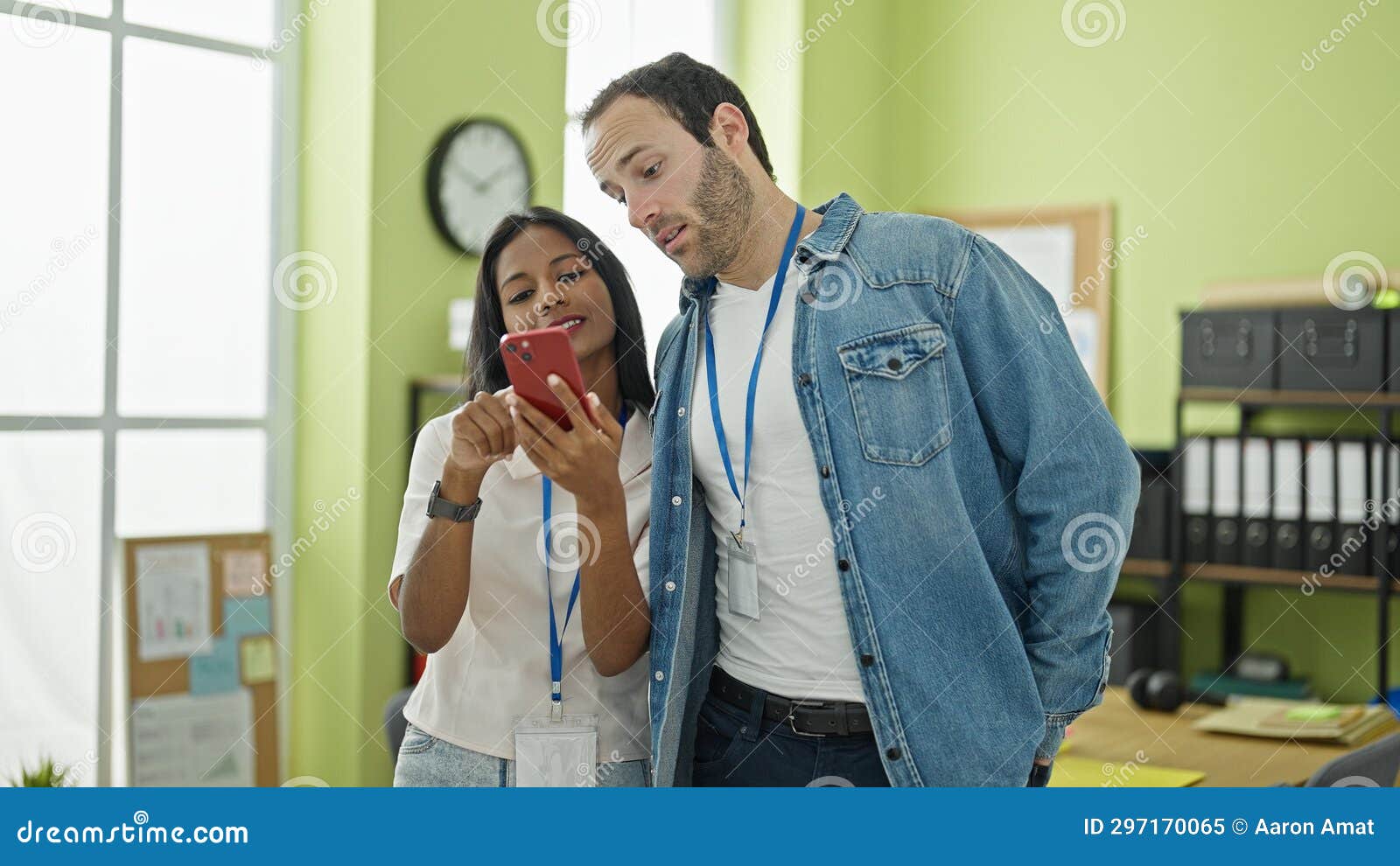 Two Workers Man and Woman Using Smartphone Working at the Office Stock ...
