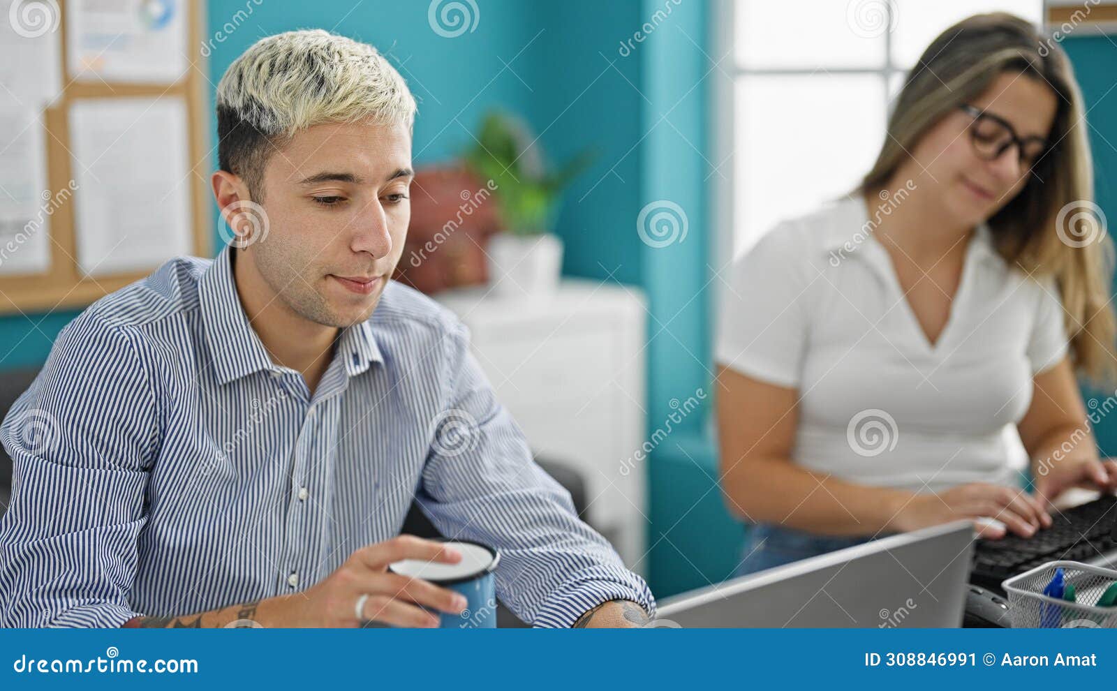 Two Workers Man and Woman Working Together Drinking Coffee at the ...