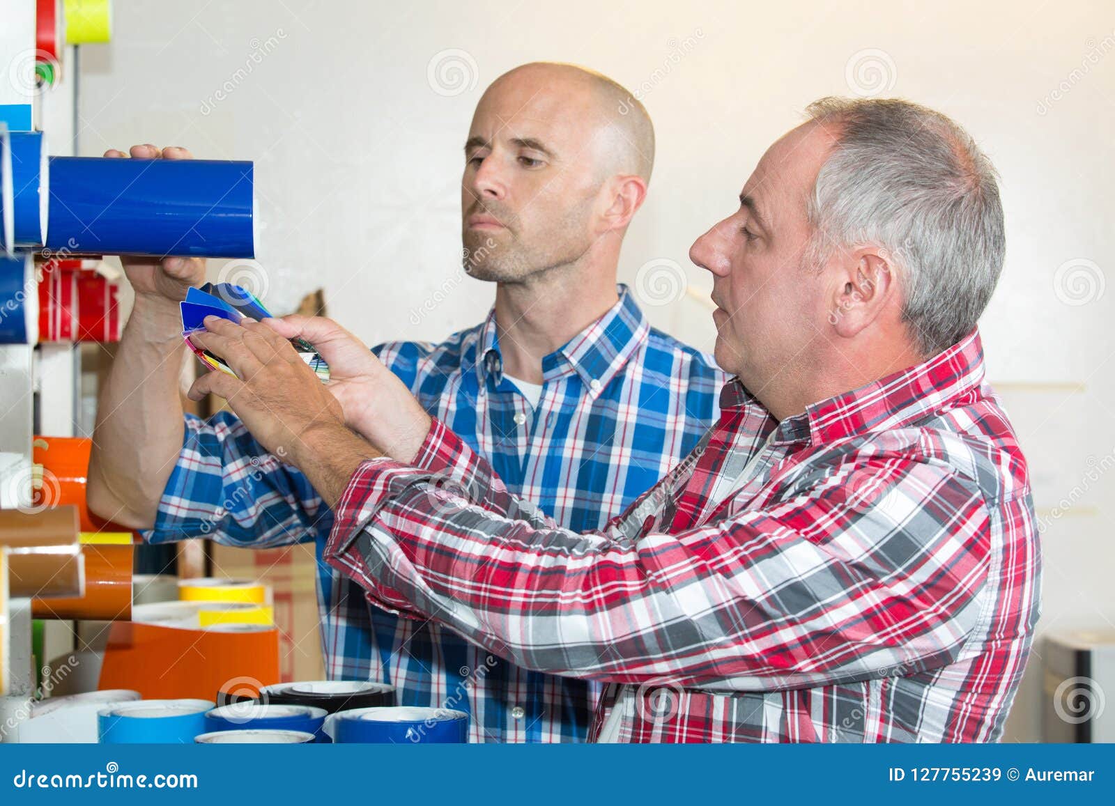 Two Workers Matching Colour F Material on Roll Stock Image - Image of ...
