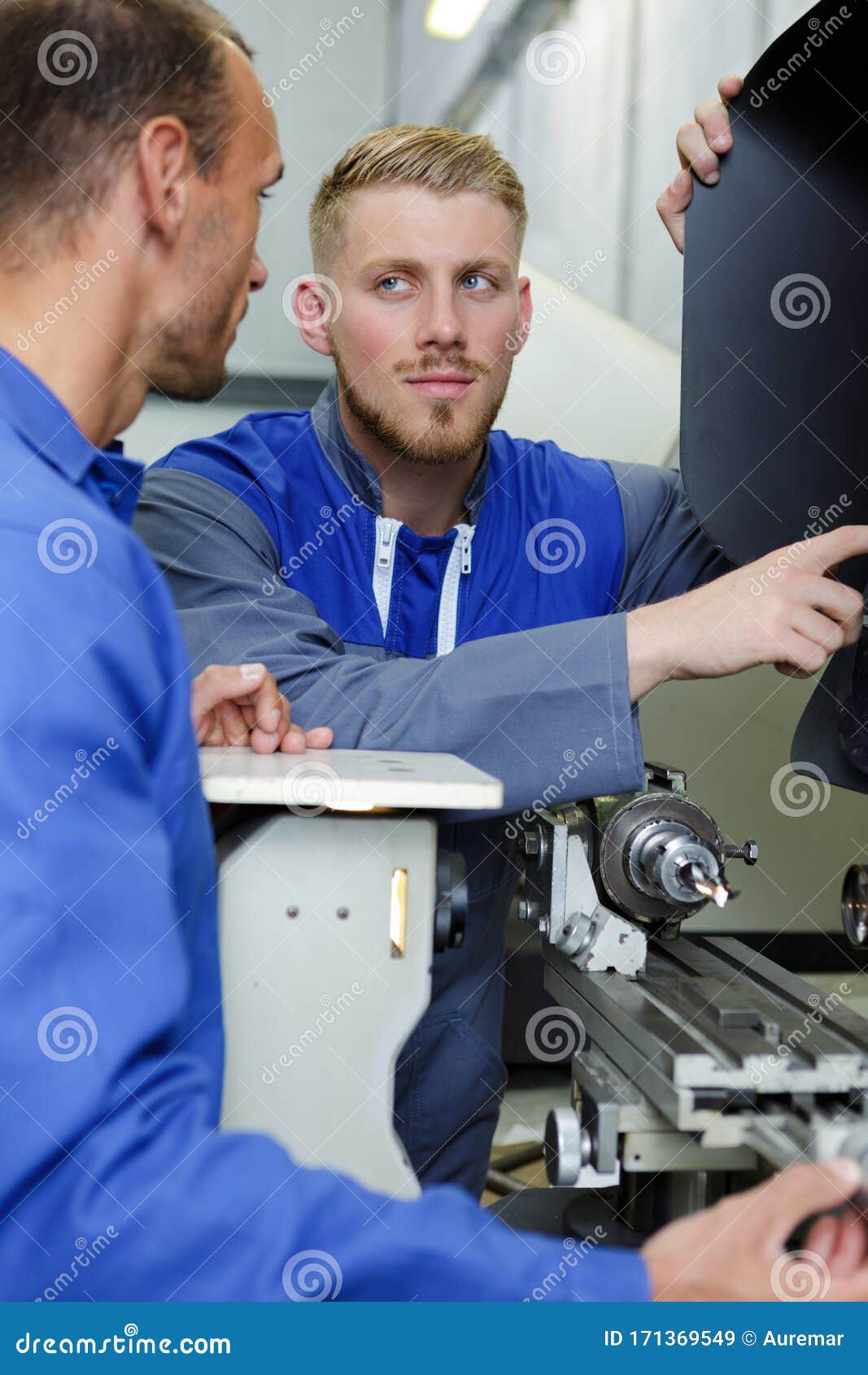 Two workers in plant stock image. Image of teamwork - 171369549
