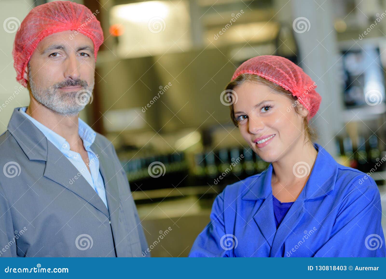 Two Workers Posing in Factory Stock Image - Image of female, workmate ...