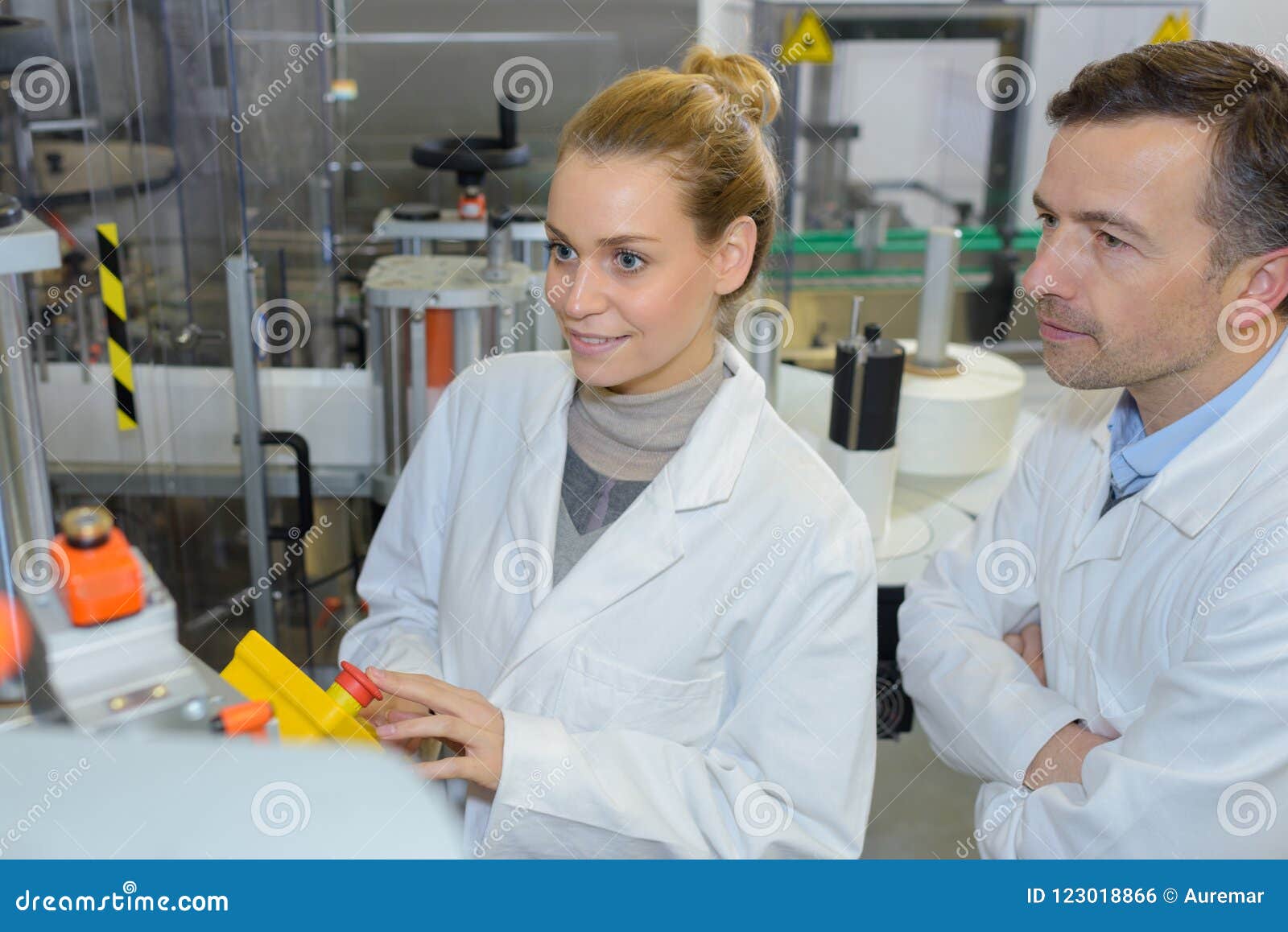 Two Workers at Production Line in High Technology Plant Stock Photo ...