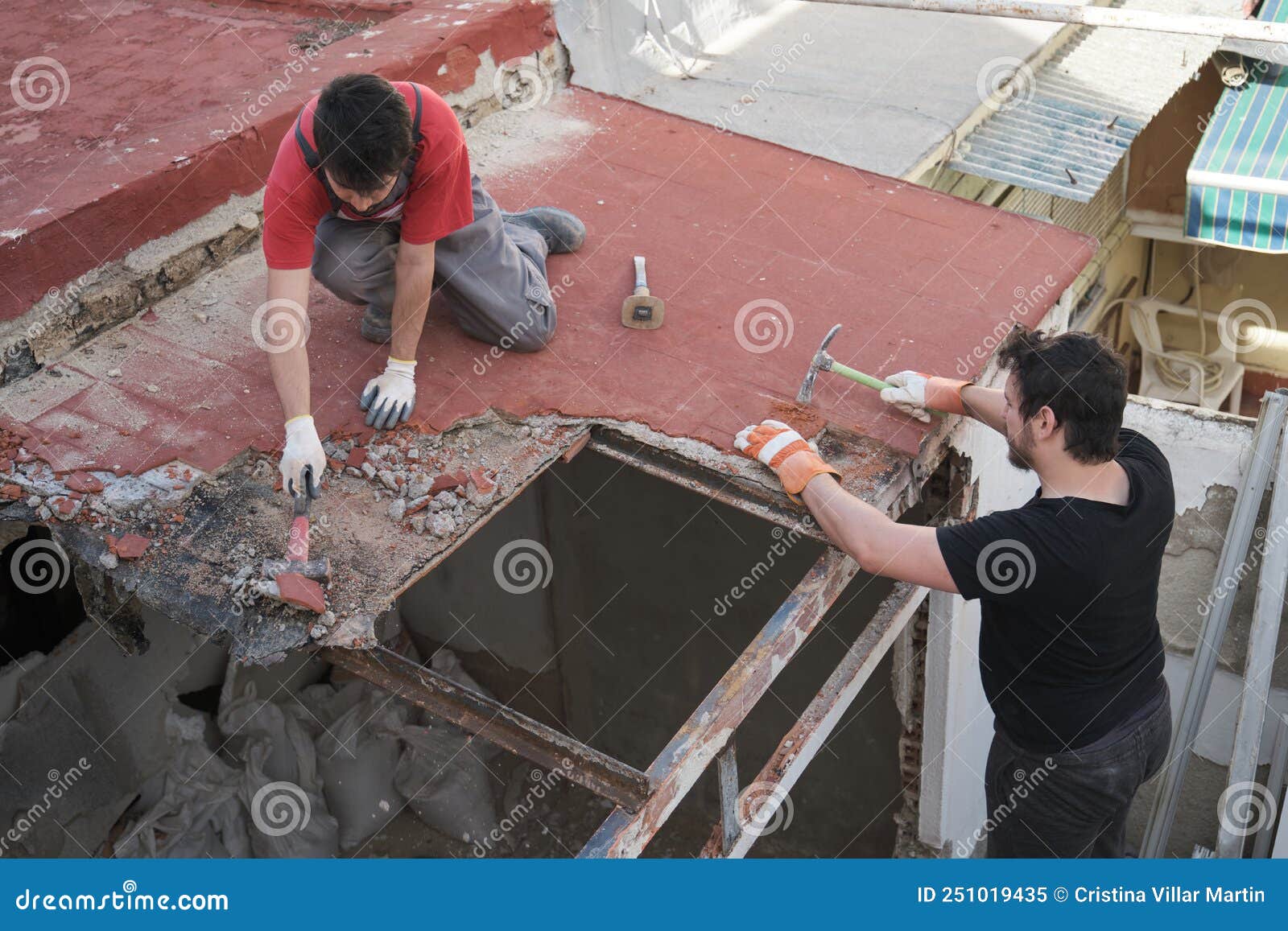 Two Workers Pulling Apart The Ceiling Of A House Down Stock Image Image Of Pull Torn 251019435