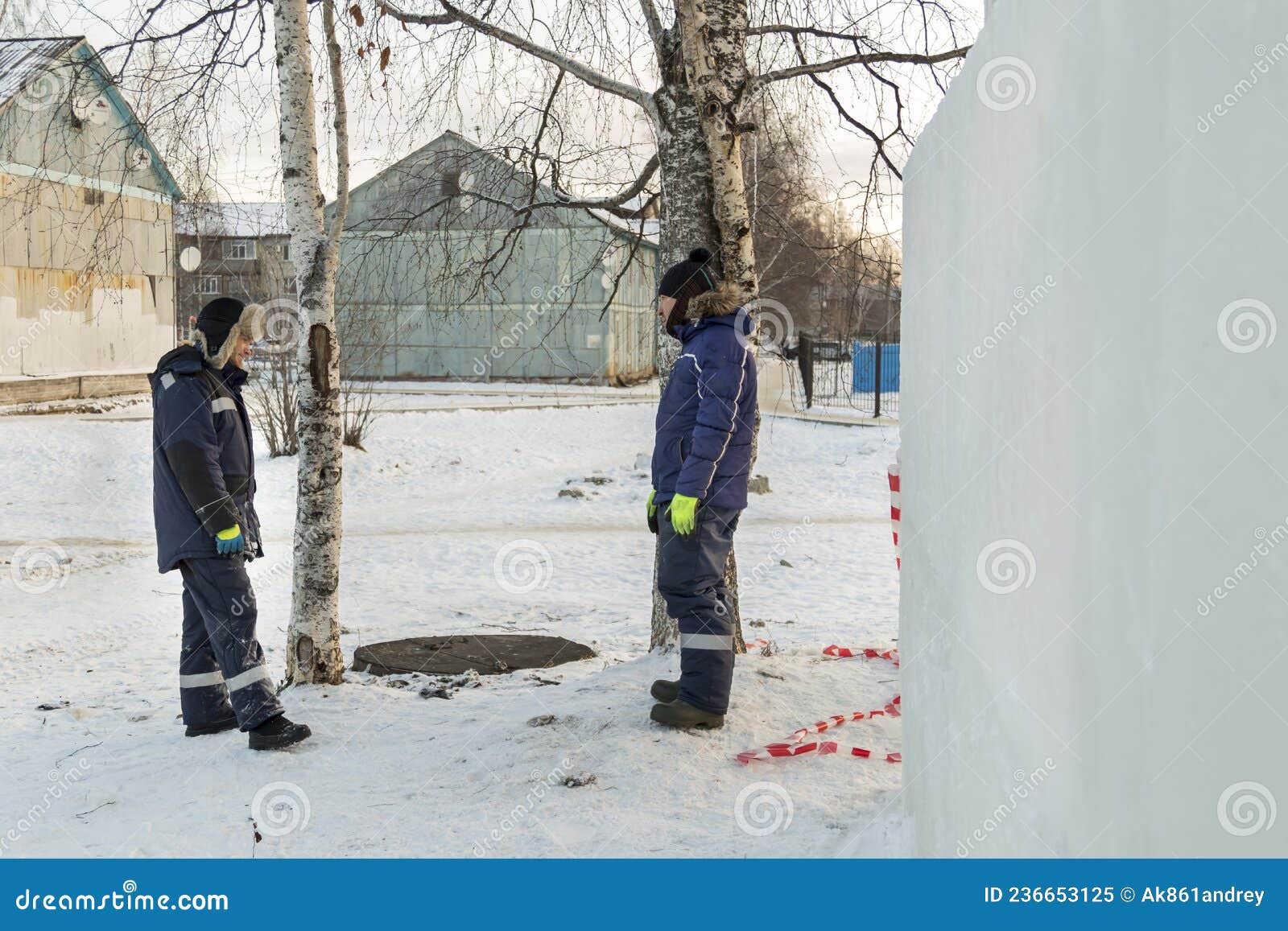 Two Workers at the Site of the Ice Camp Stock Image - Image of builders ...