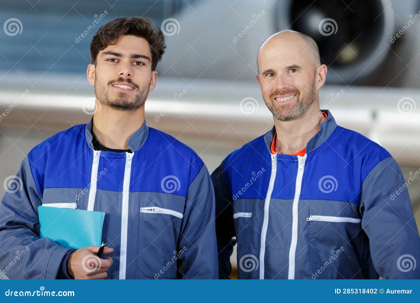 Two workers smiling stock photo. Image of maintenance - 285318402