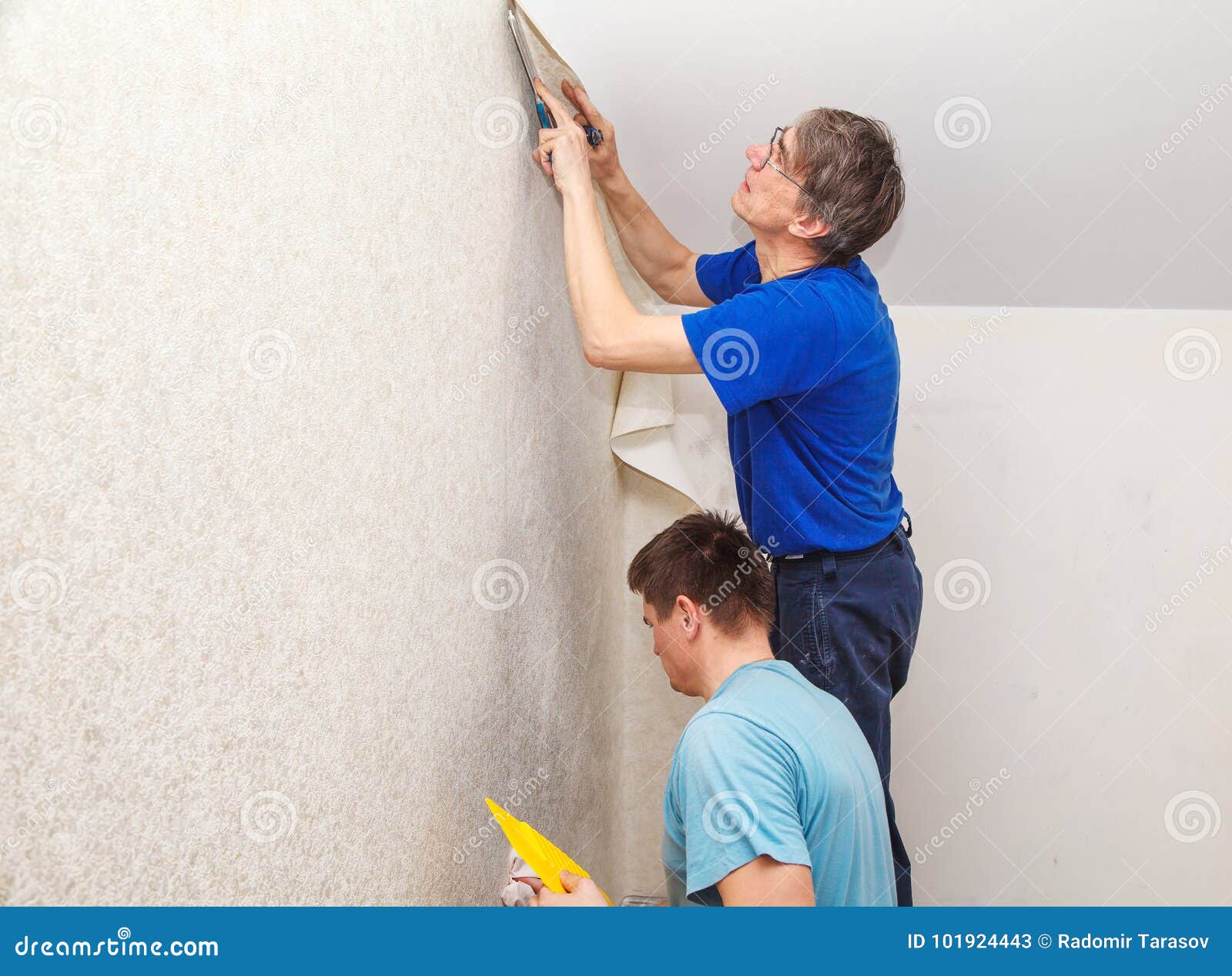 Two Workers Smoothing Wallpaper Stock Image - Image of remodel ...