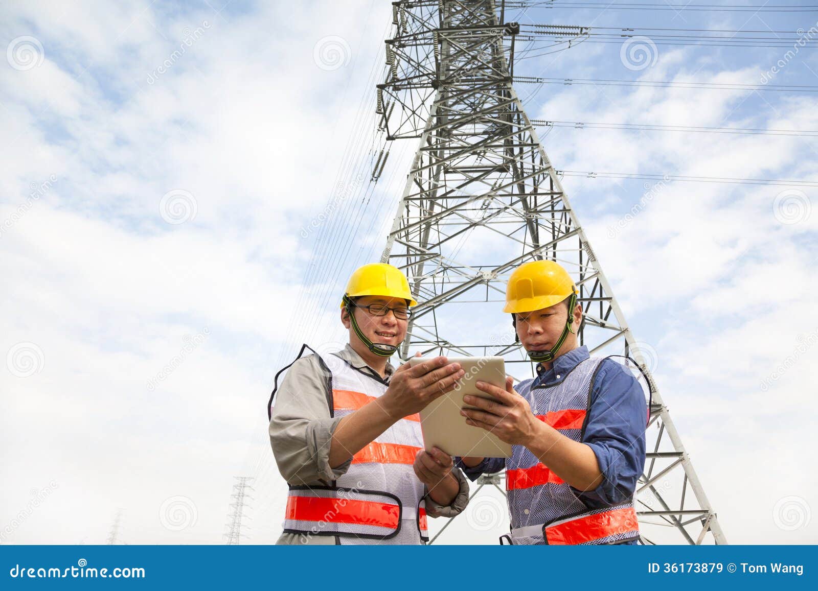 Two Workers Standing before Electrical Power Tower Stock Image - Image ...