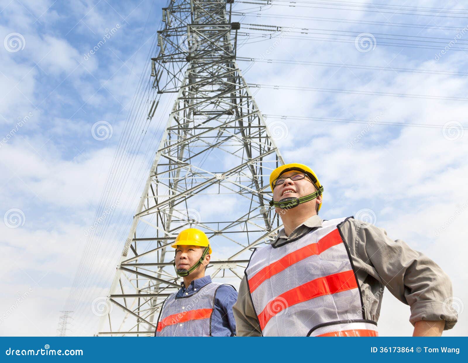 Two Workers Standing before Electrical Power Tower Stock Photo - Image ...