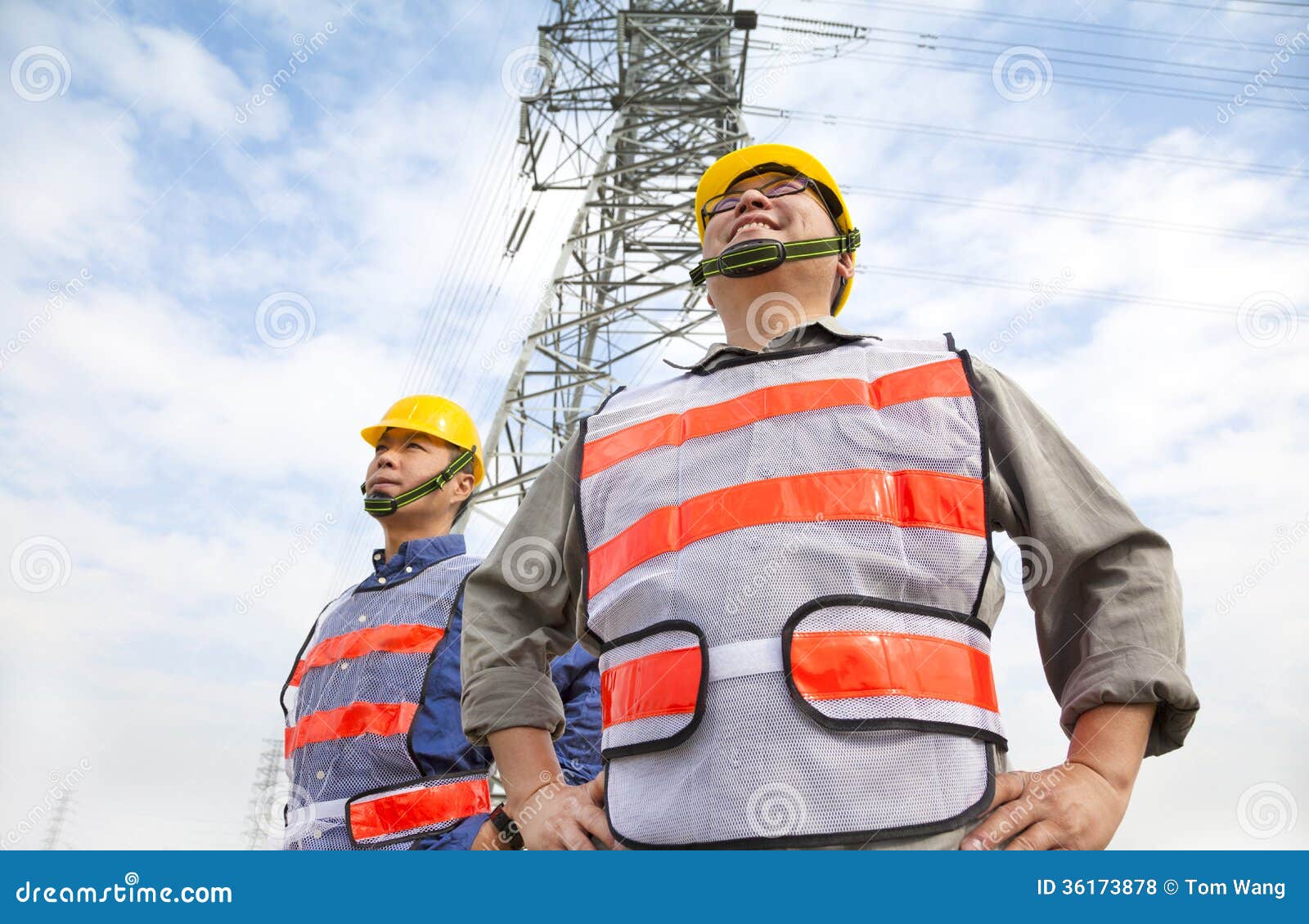 Two Workers Standing before Electrical Power Tower Stock Photo - Image ...
