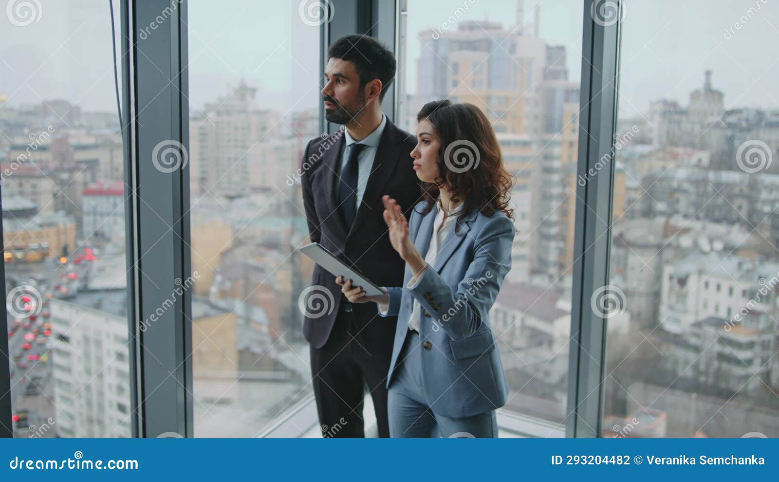 Two Workers Talking Office Corridor Looking on City. Colleagues ...